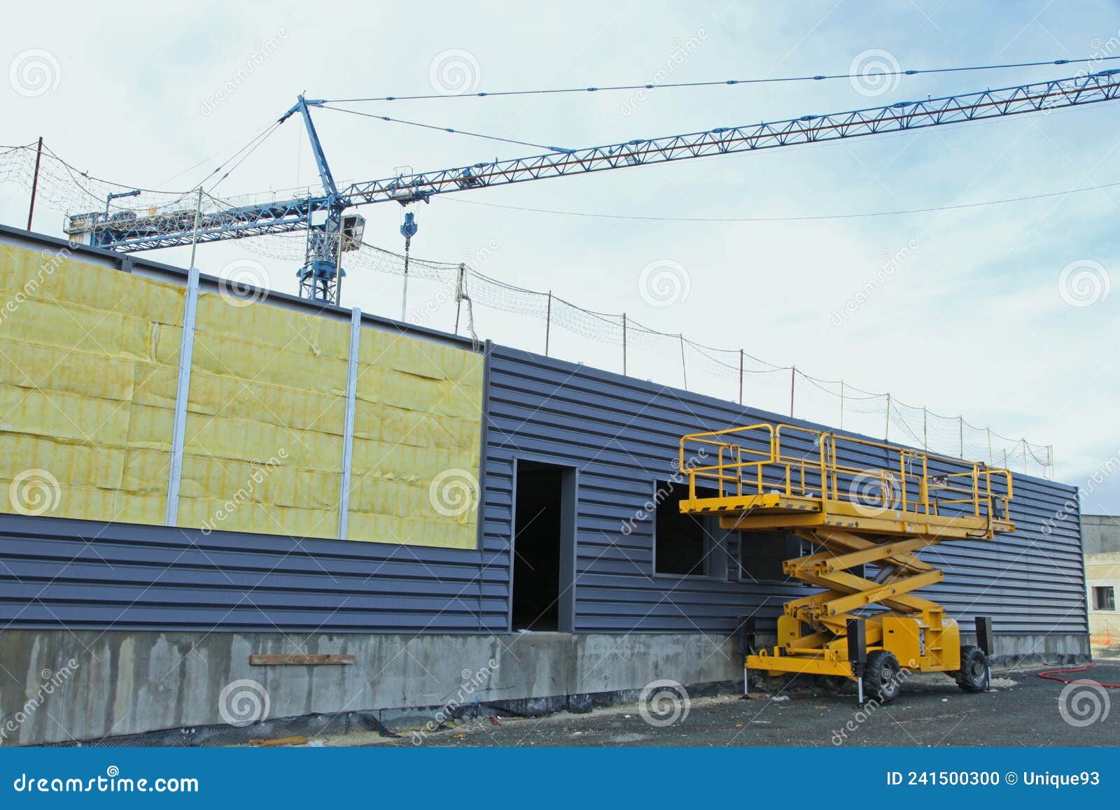 Aerial Work Platform on an Insulation Site of a Commercial Building ...