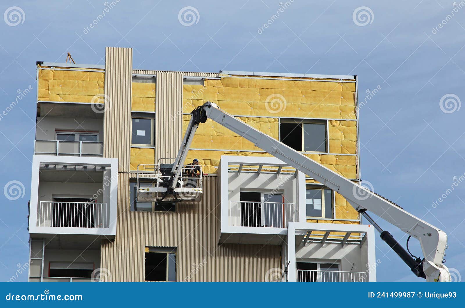 Aerial Work Platforms on an Insulation Site of a Building Stock Image ...