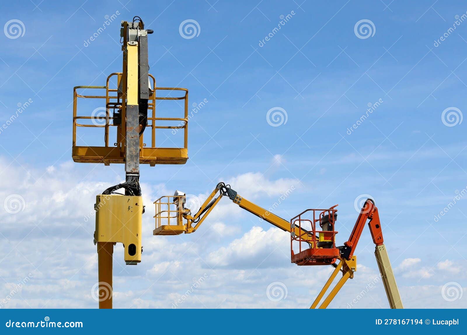 Aerial Working Platforms of Cherry Picker Against Blue Sky with Clouds ...