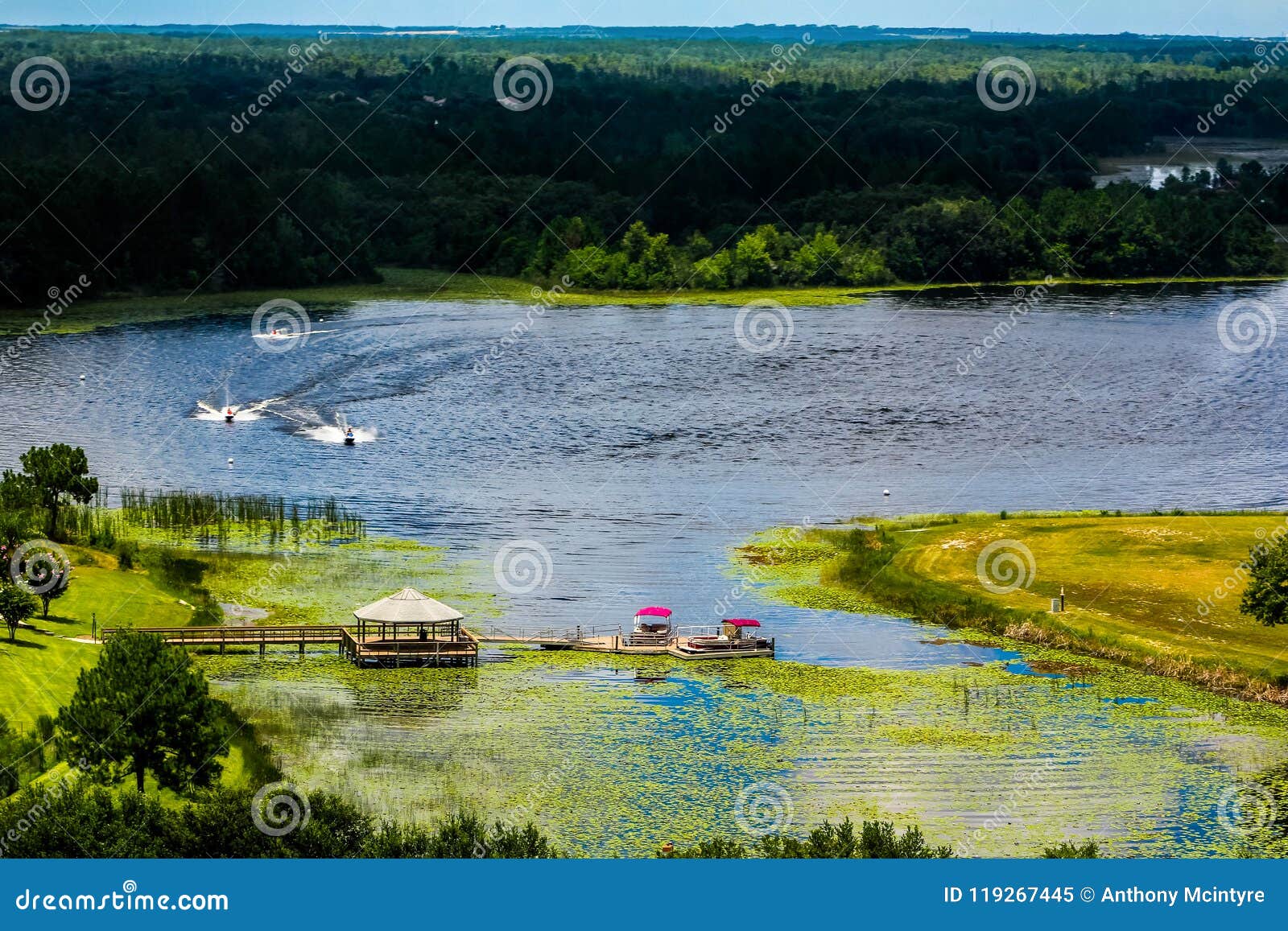 Aeriel View of Lake with Jet Ski Riders, Docks and Pontoon Boats Stock ... Aeriel View of Lake with Jet Ski Riders, Docks and Pontoon Boats Stock ...