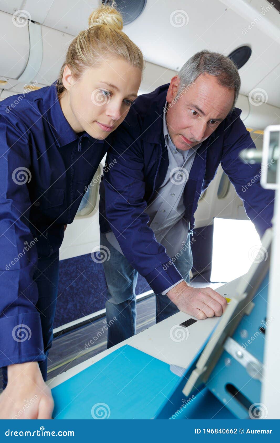 Aero Engineer and Apprentice Working on Aircraft Stock Photo - Image of ...