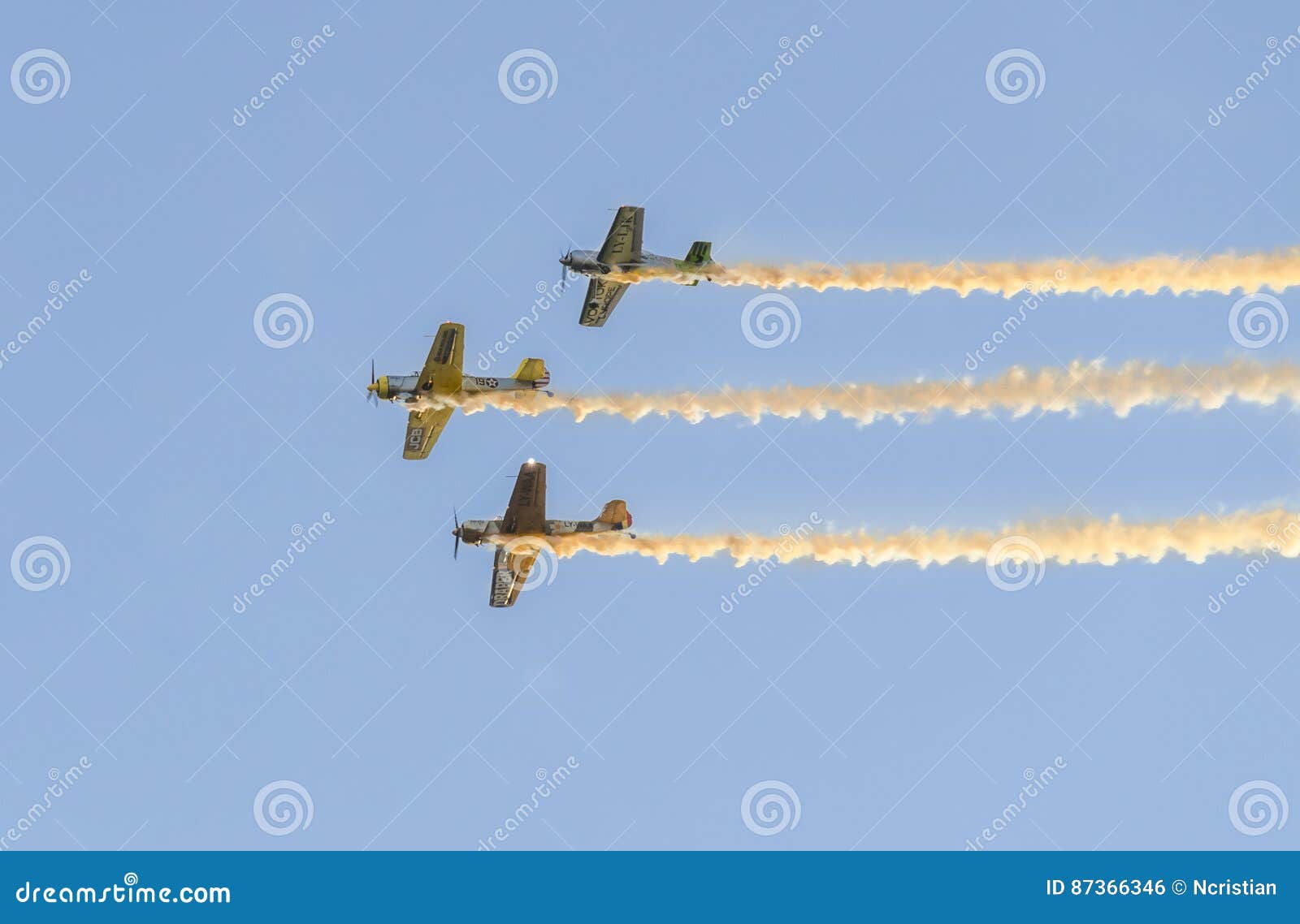 Aerobatic Pilots Training in the Blue Sky, Airplanes with Colored Trace ...