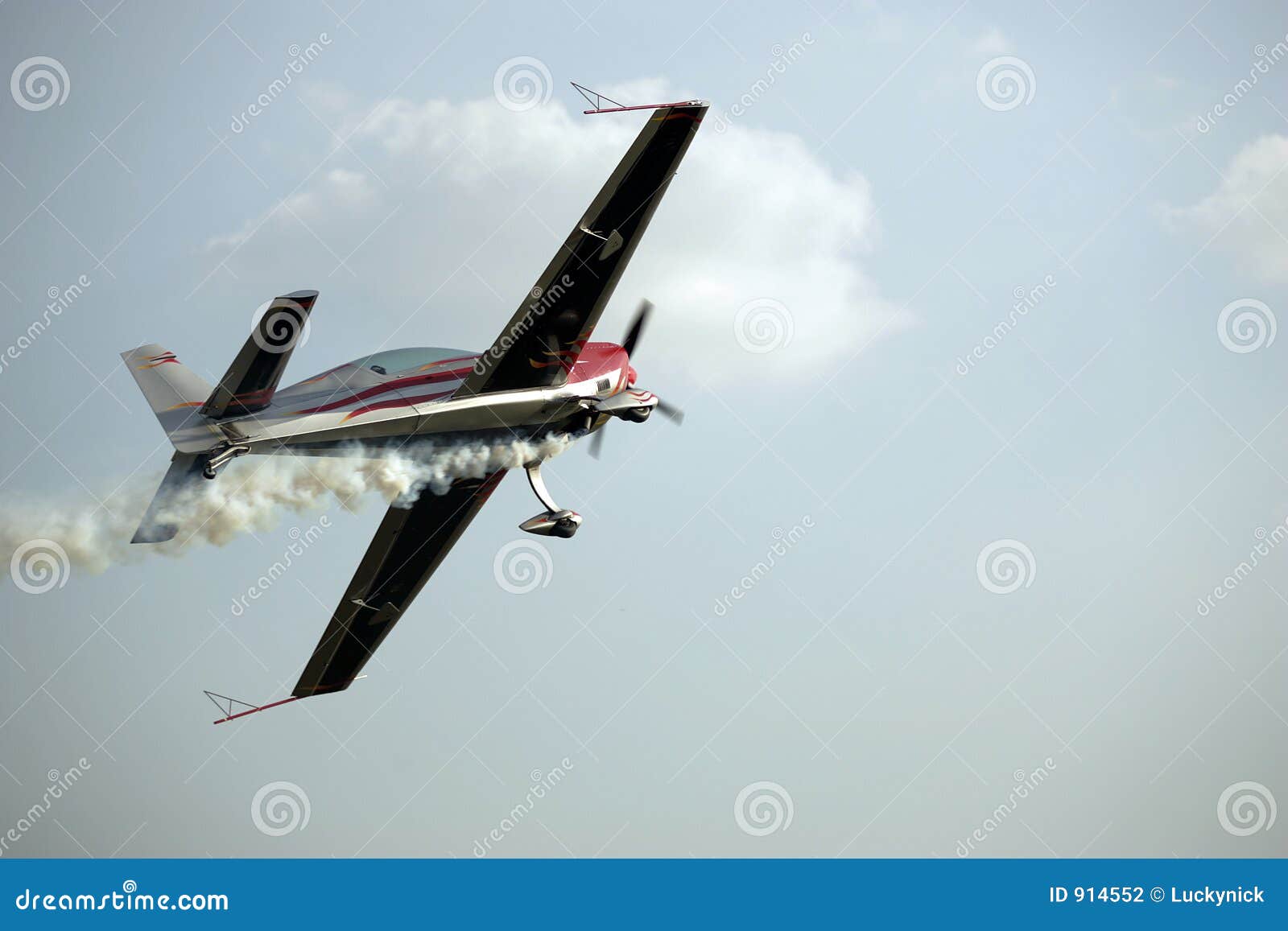 Aerobatic Plane Trailing Smoke Stock Photo - Image of smoking, smoke ...
