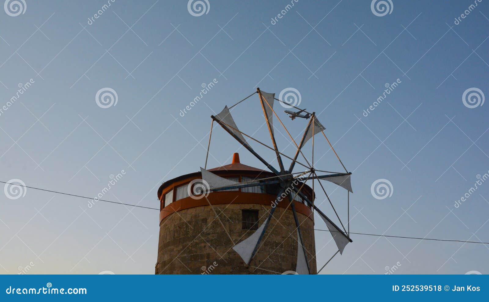 Aeroplane Flying through a Windmill Stock Photo - Image of aeroplane ...