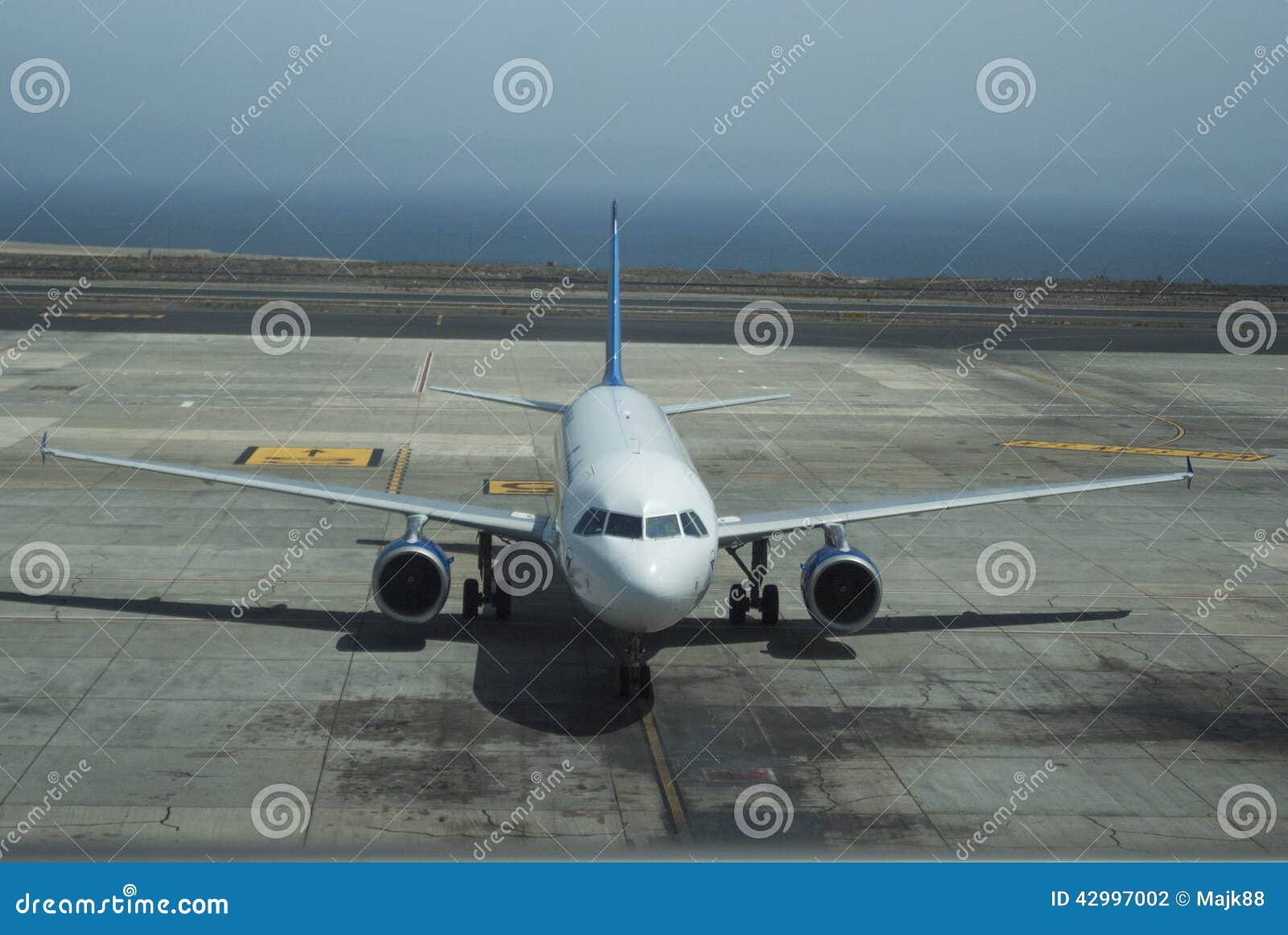 Aeroplane on the ground stock photo. Image of travel - 42997002
