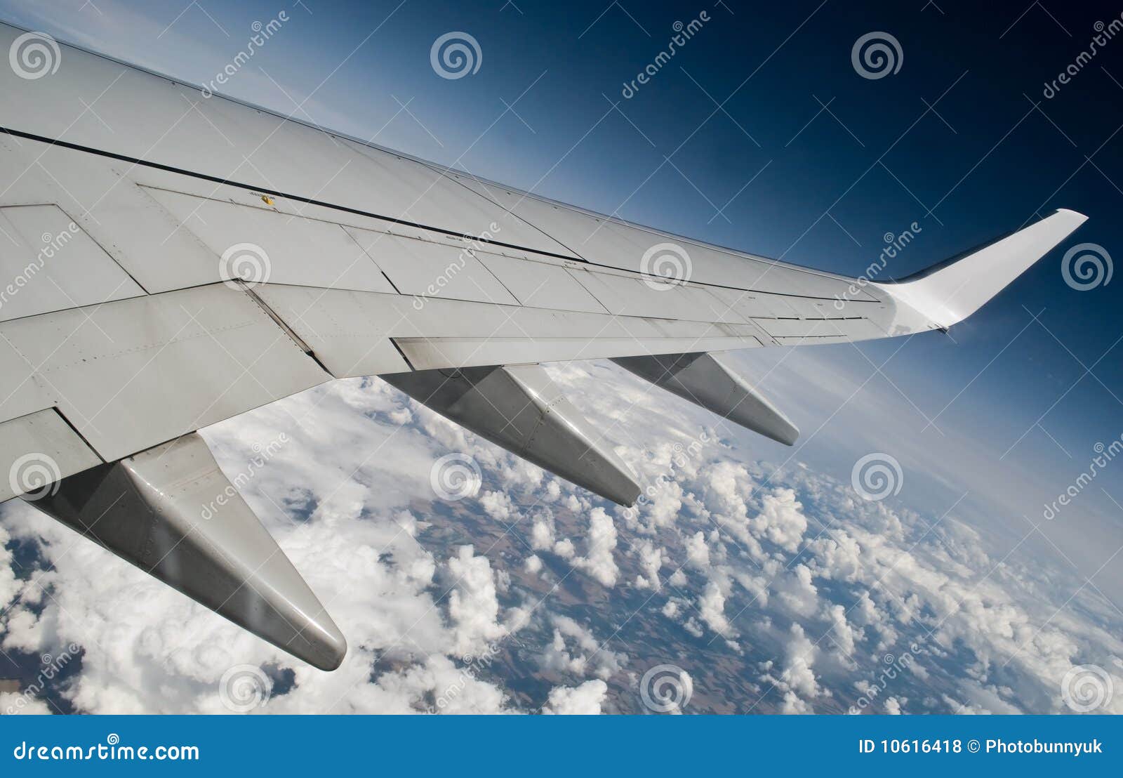 Aeroplane wing in the sky. stock photo. Image of craft - 10616418