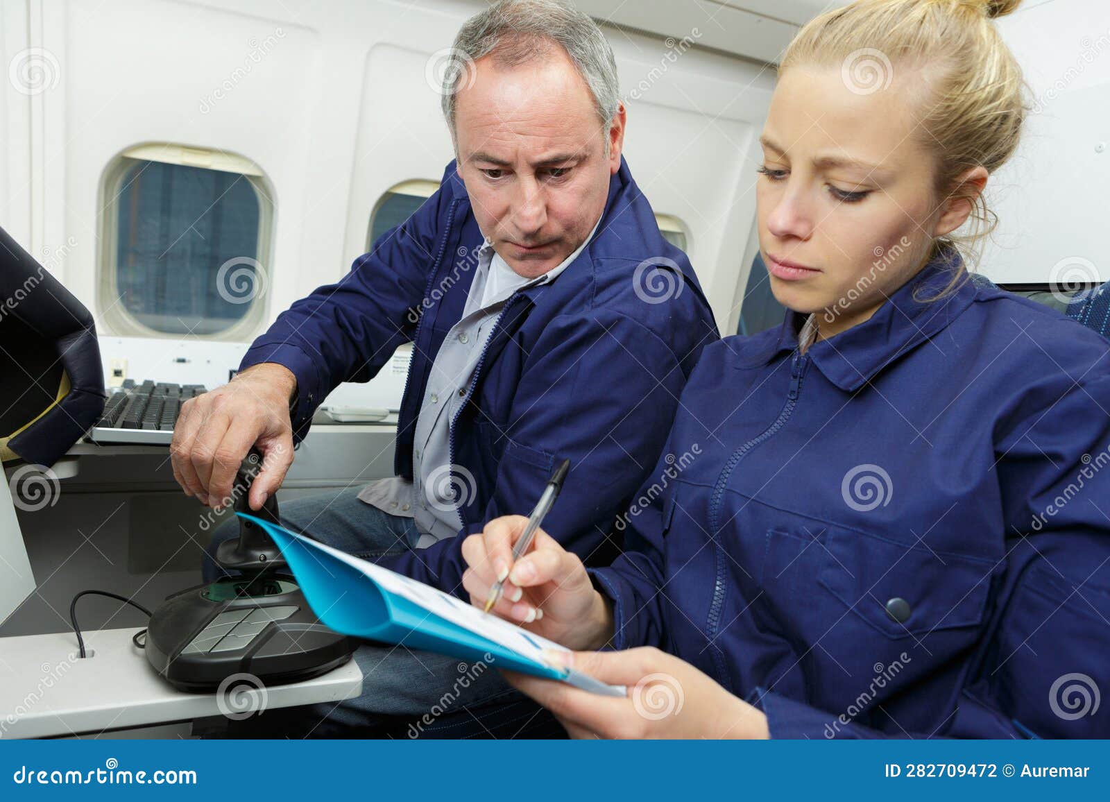 Aerospace Engineers in Aircraft Interior Stock Photo - Image of ...