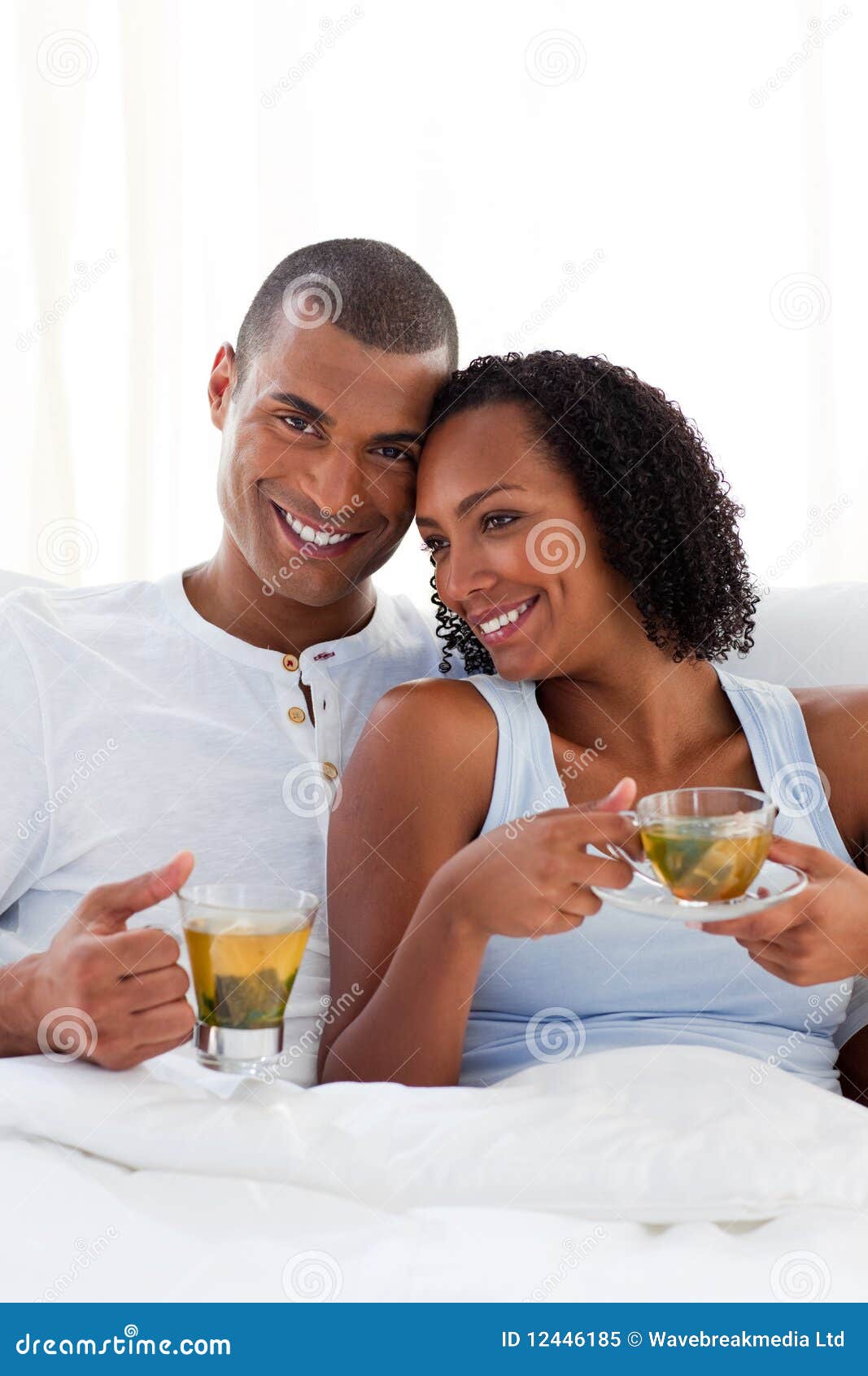 Affectionate Couple Drinking a Cup of Tea Stock Image - Image of afro ...