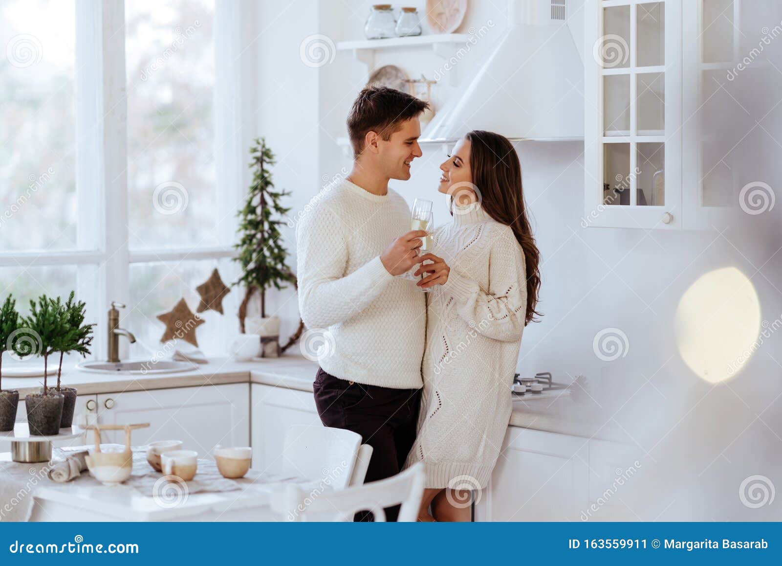 Affectionate Couple Hugging in Kitchen Stock Image - Image of coffee ...