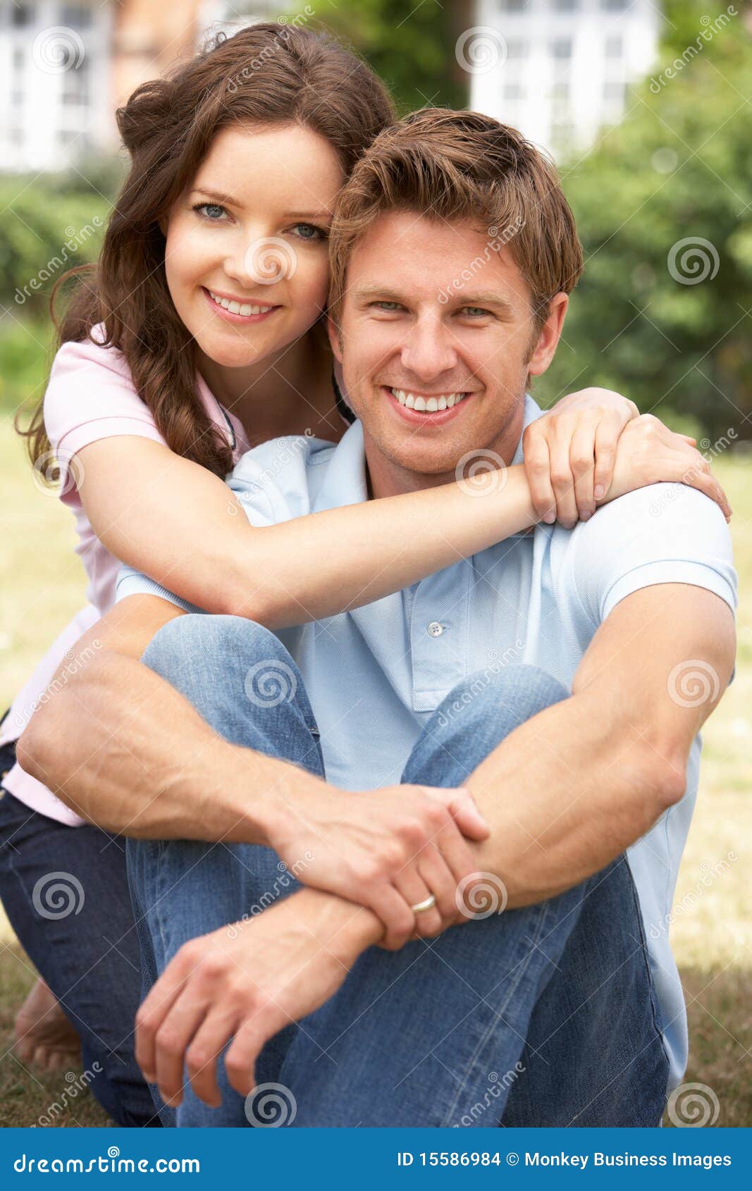 Affectionate Couple Relaxing at Home in Garden Tog Stock Photo - Image ...