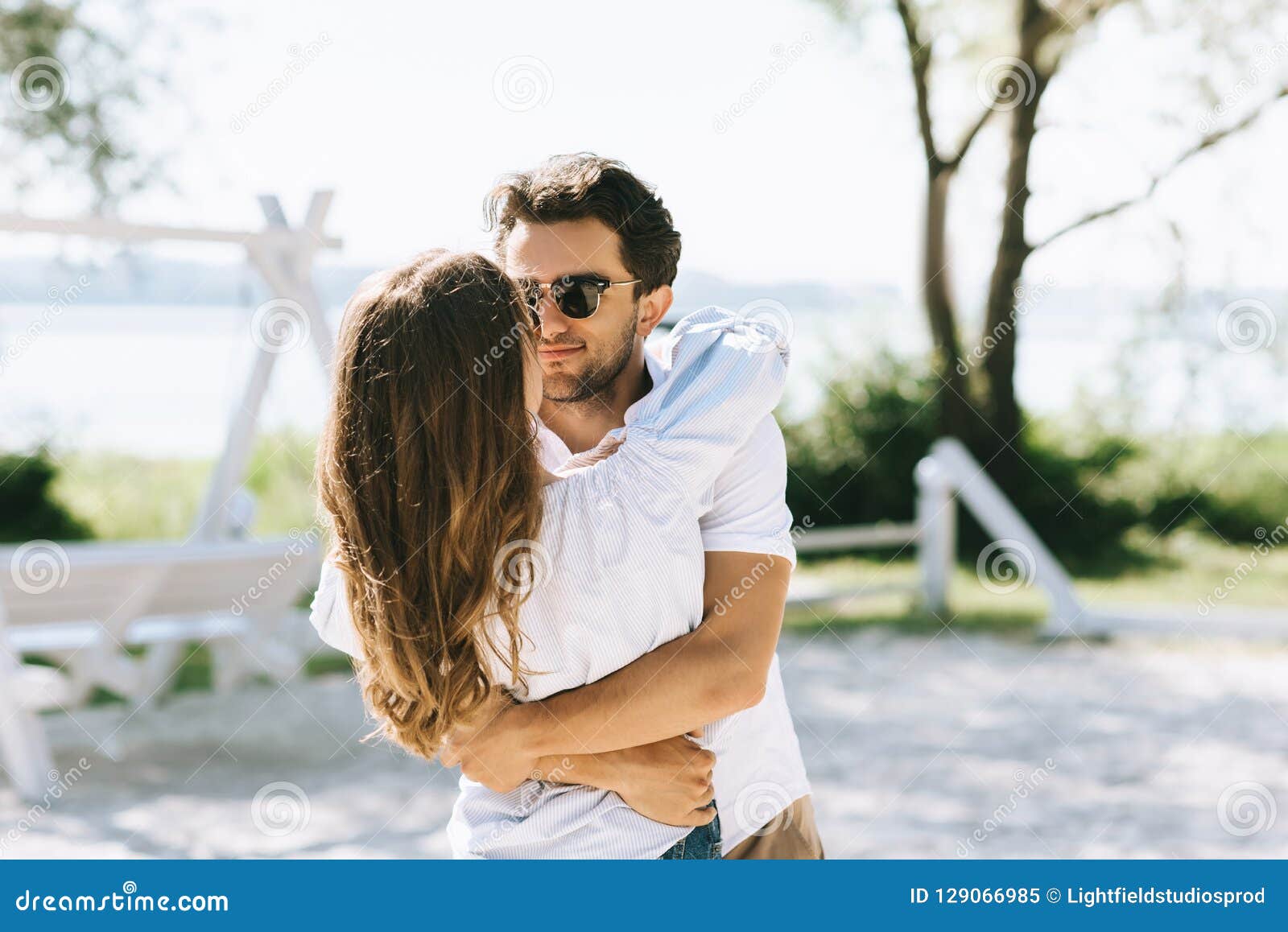 Affectionate Couple in Sunglasses Cuddling Stock Image - Image of ...