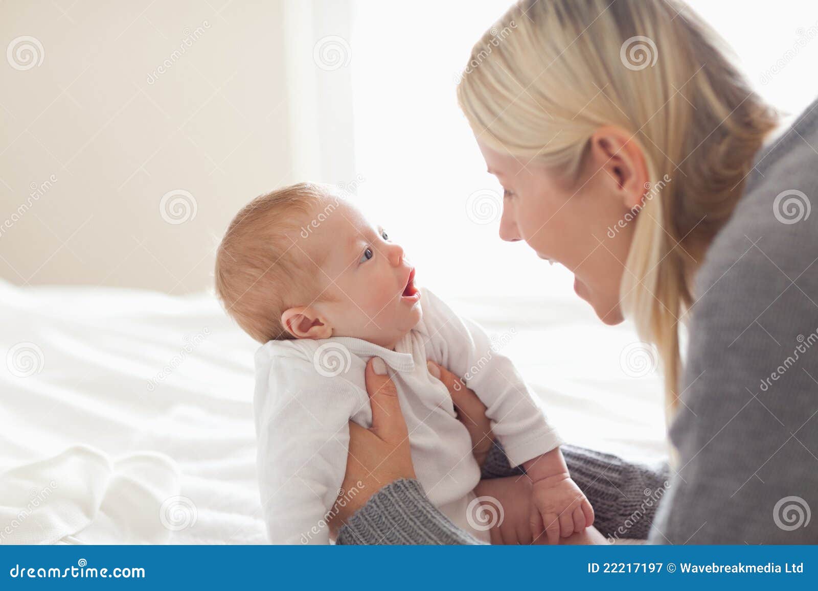 Affectionate Mom Holding Her Newborn Stock Image - Image of caucasian ...