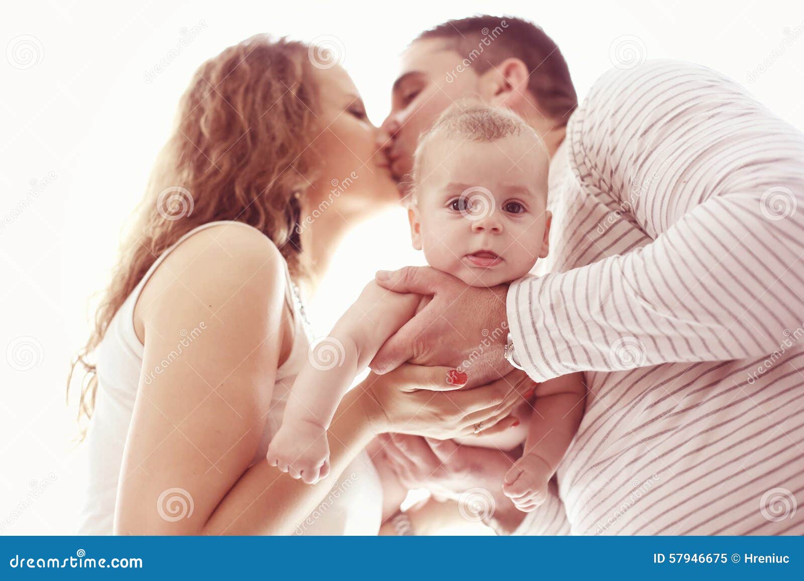 Affectionate Parents Holding Their Baby Boy Stock Image - Image of baby ...