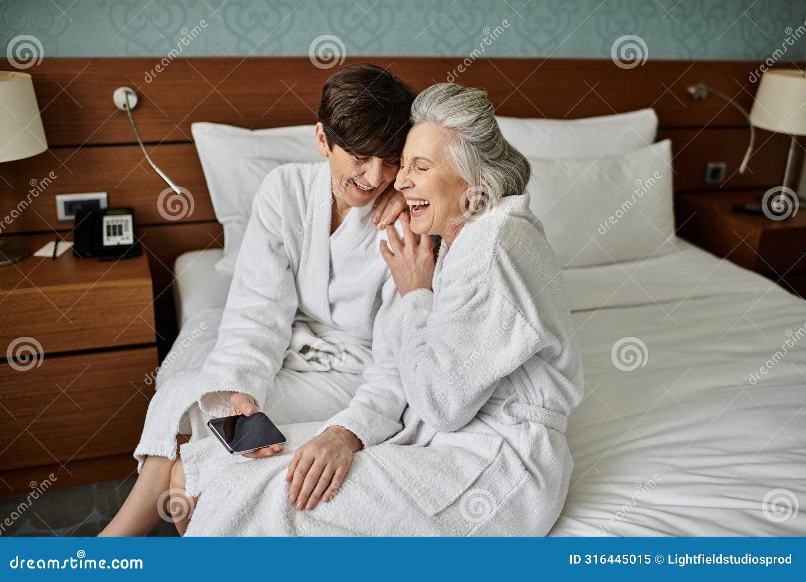 Affectionate Senior Lesbian Couple Sitting On Stock Image Image Of