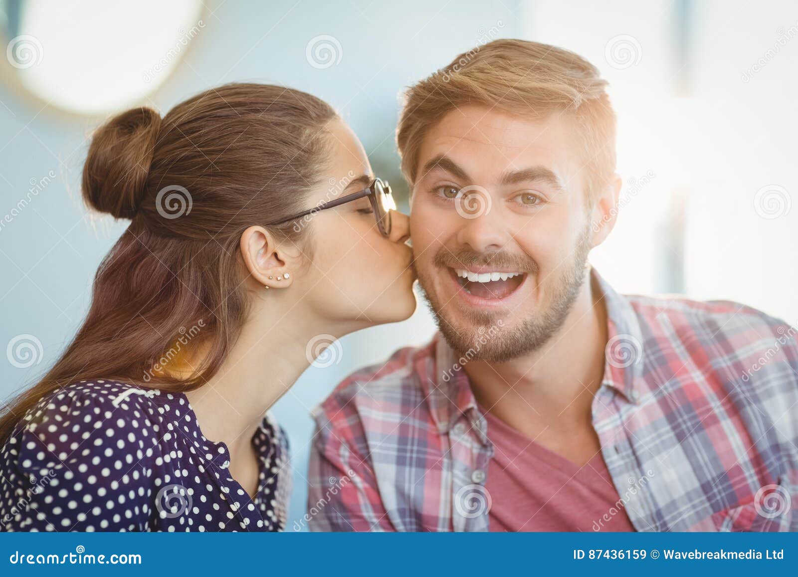 Affectionate Woman Kissing Man Stock Image - Image of clothing ...