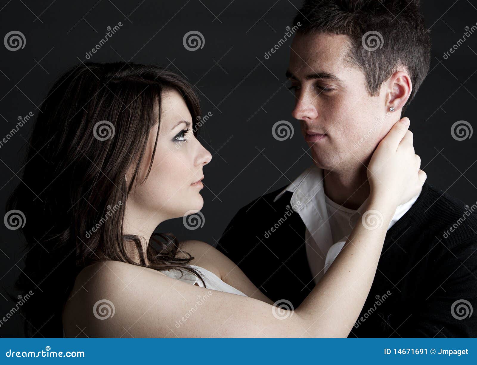 Affectionate Young Couple in Love Stock Image - Image of brown, studio ...
