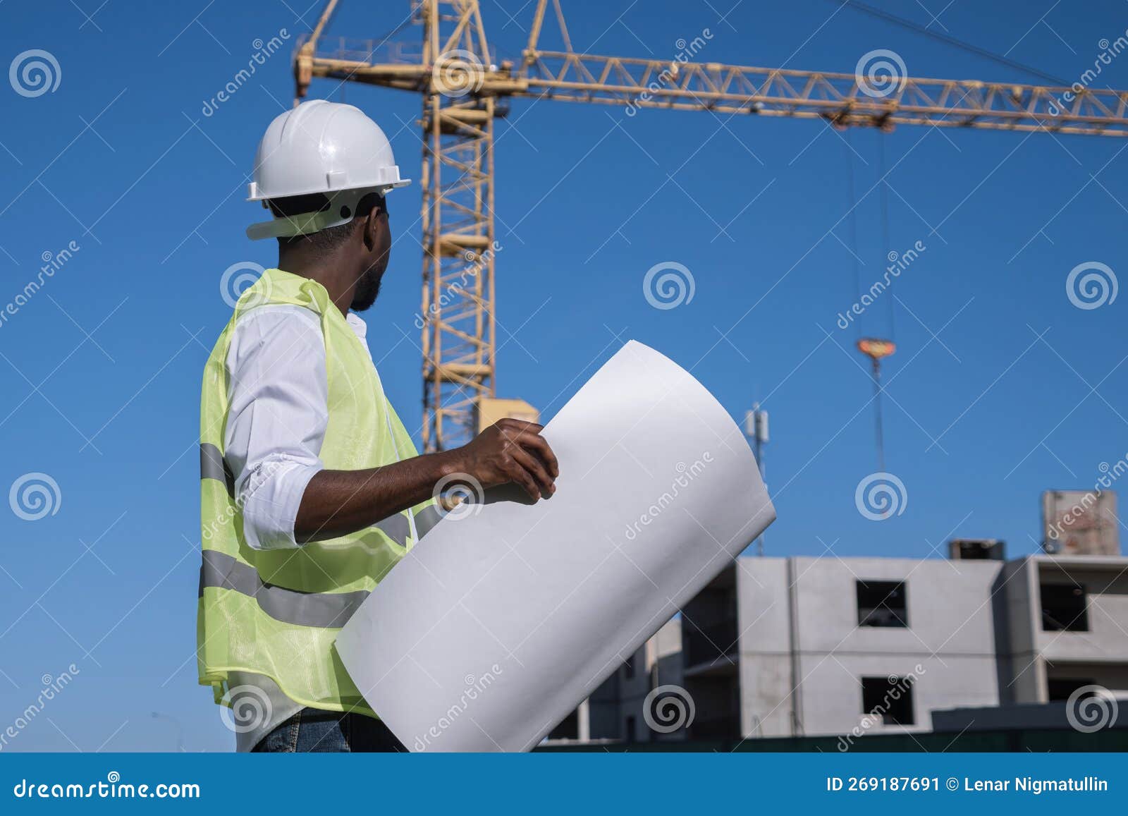 African American Architect Compares Building To Drawings Stock Image ...