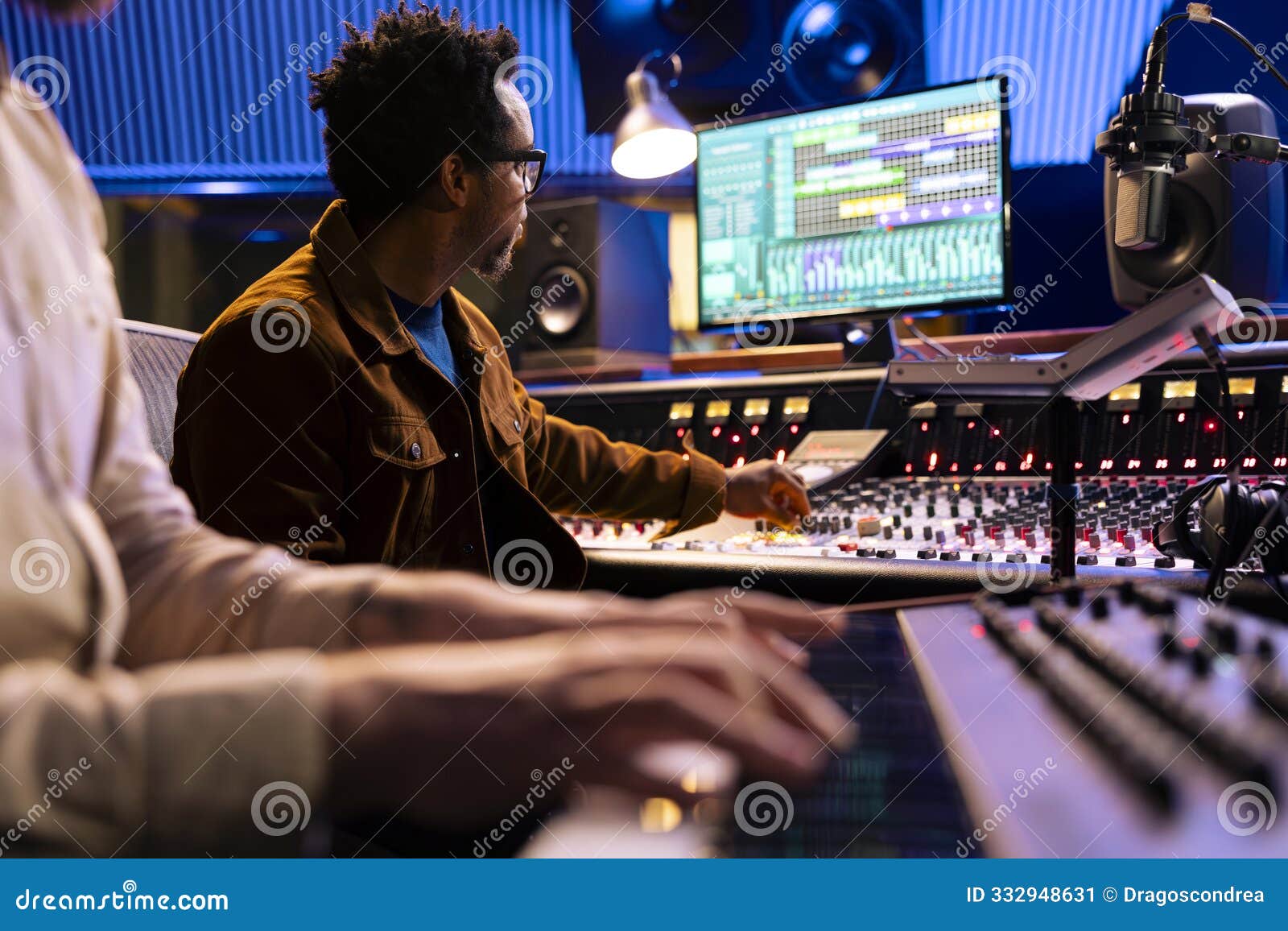 African American Audio Expert Records Artist Playing Piano in Studio ...