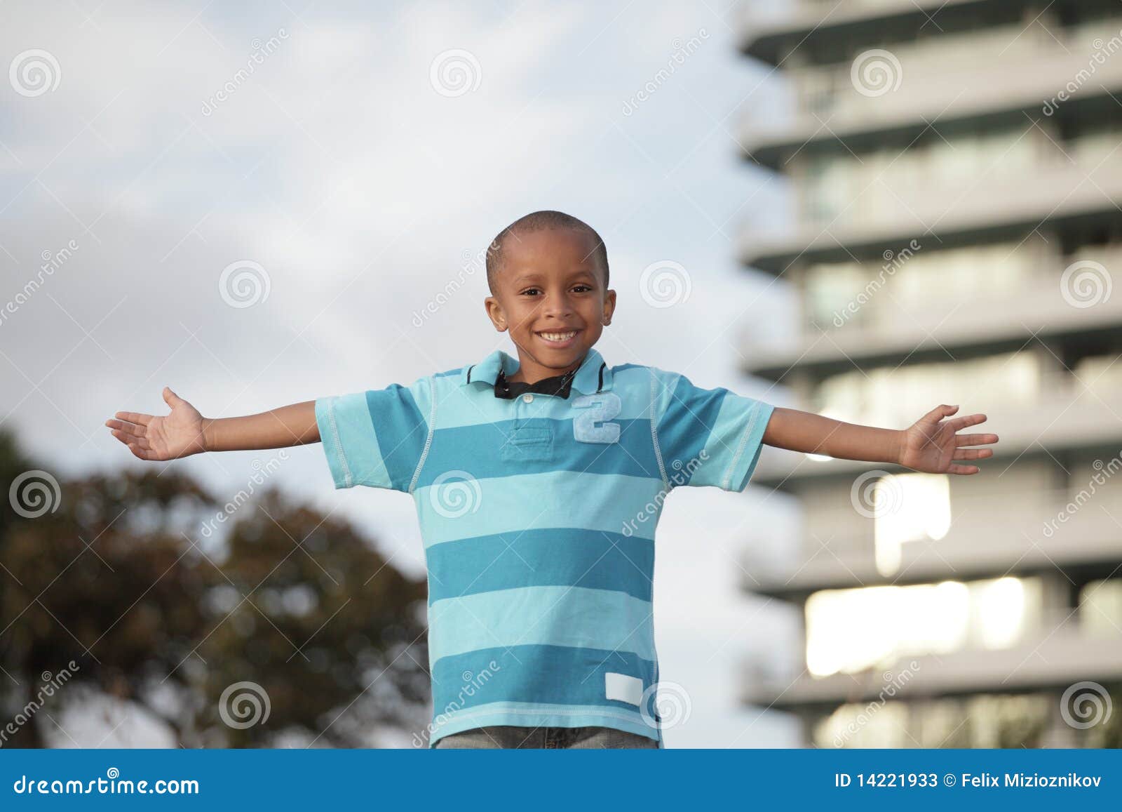 African American Boy with Arms Outstretched Stock Image - Image of male ...