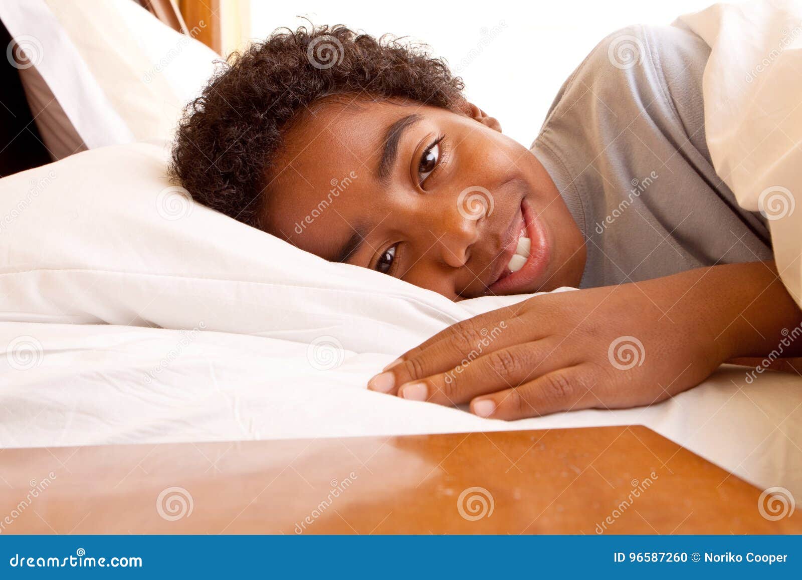 African American Boy Sleeping in His Bed. Stock Photo - Image of modern ...