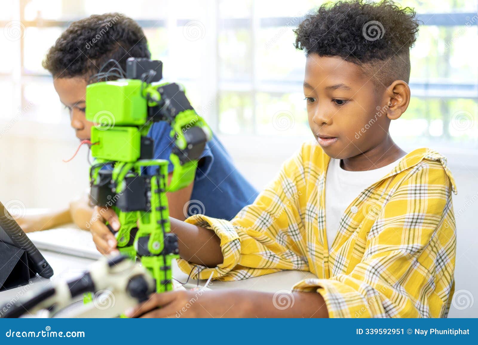 African American Boys are Setting Robot Kit in Class Room Stock Image ...