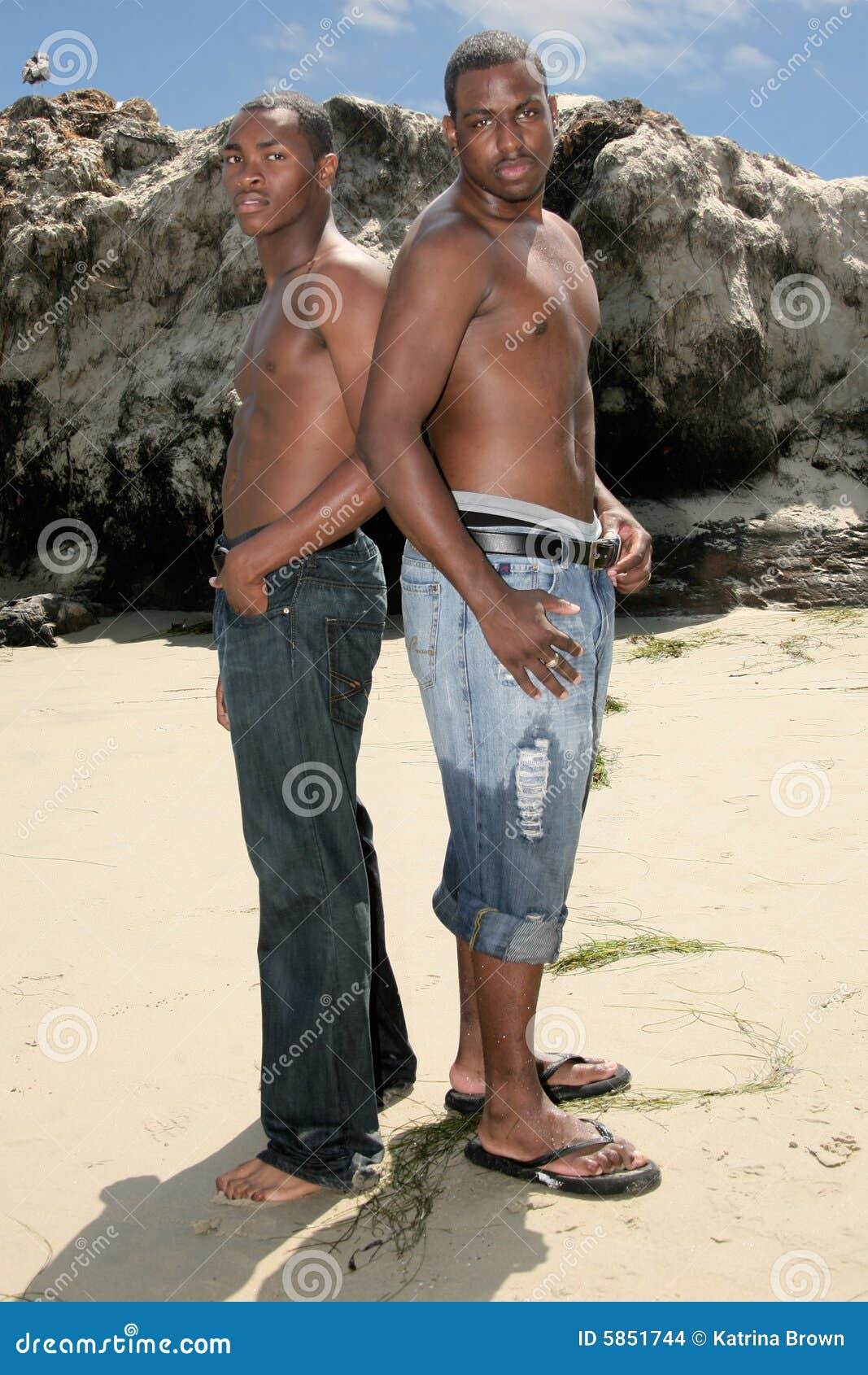 African American Brothers Standing on the Sand at Stock Photo - Image ...