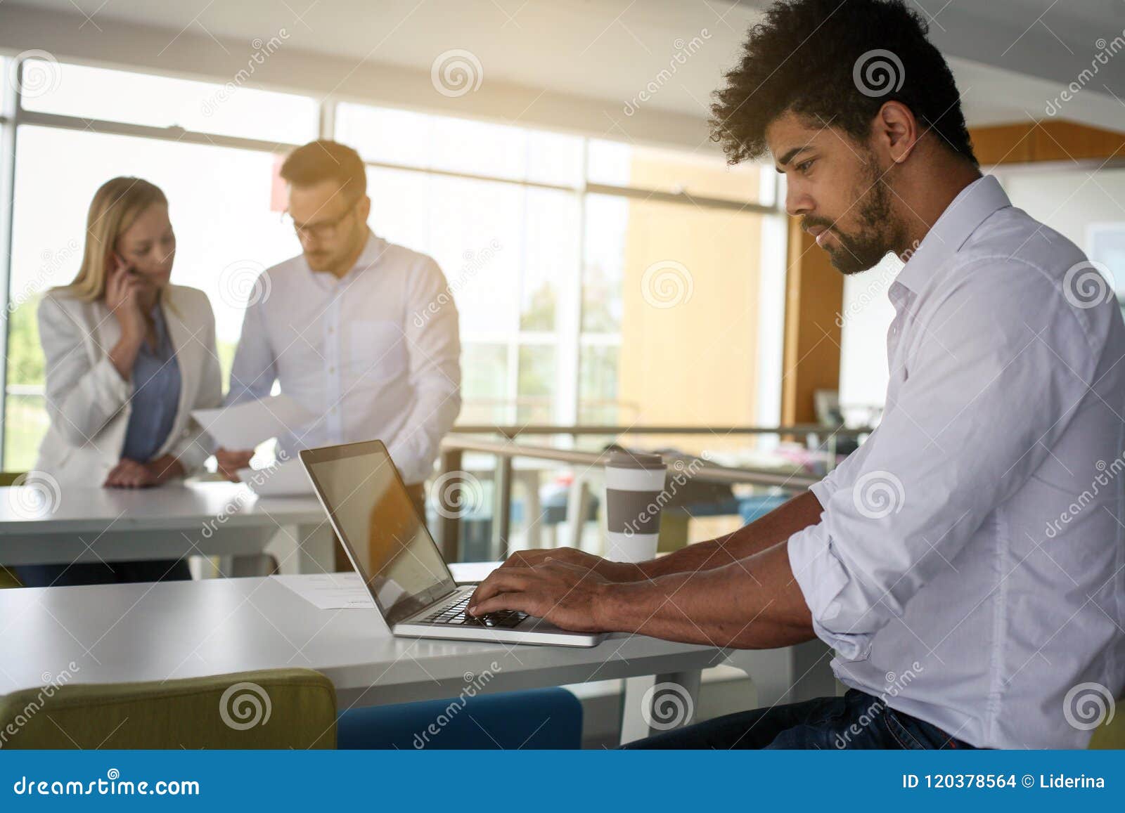 African American Business Man Using Computer at the Office. Afri Stock ...