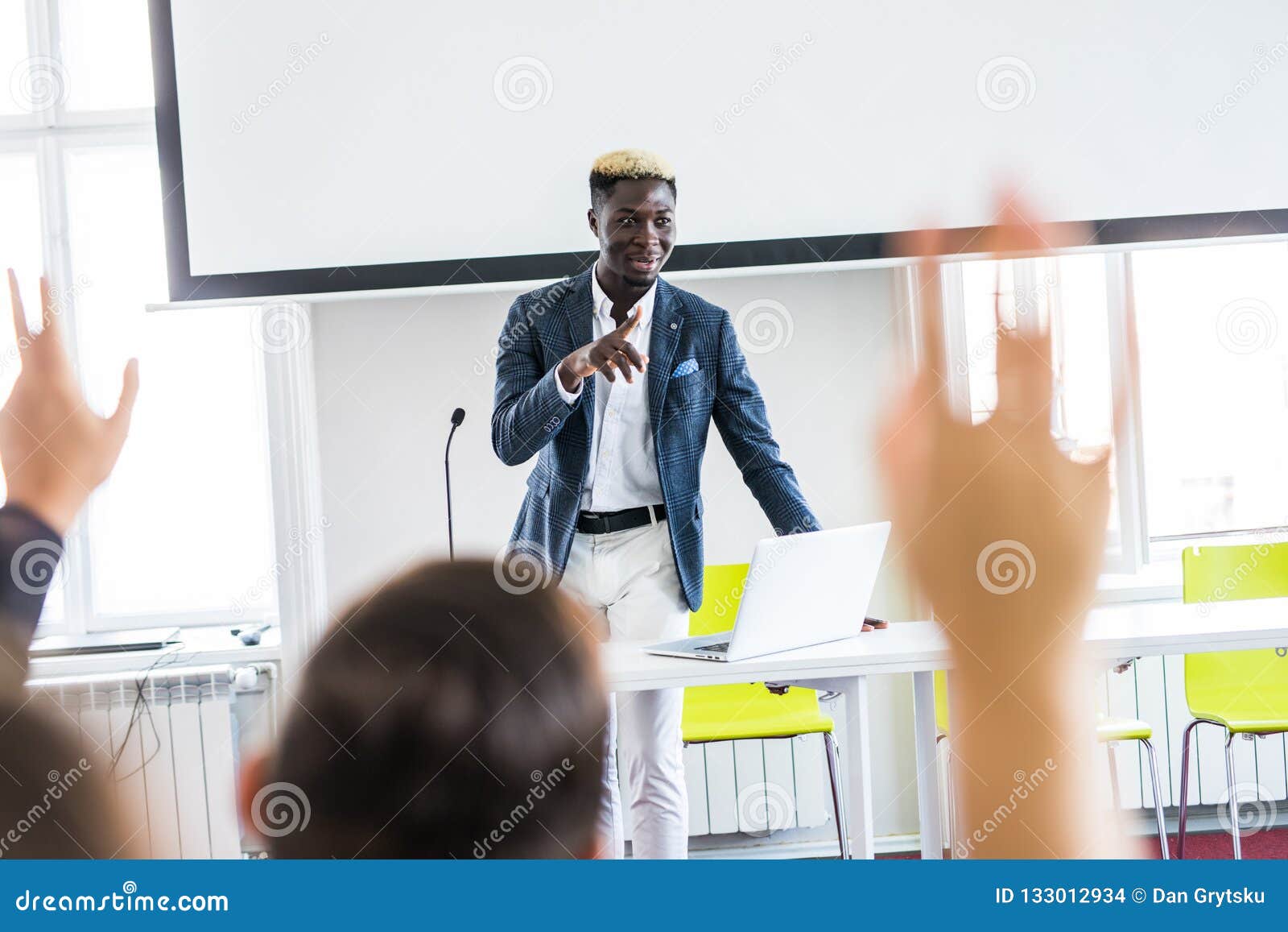 African American Businessman Giving Presentation Discussing Project