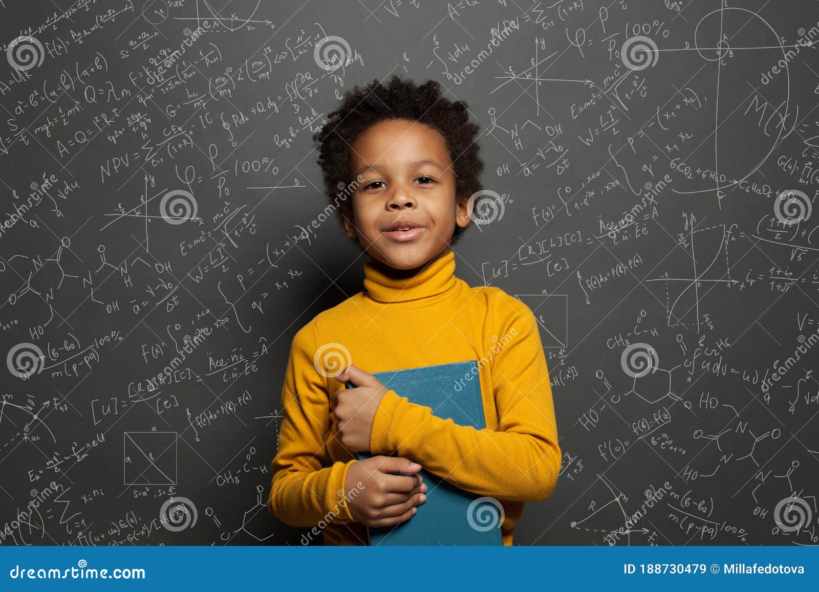 African American Child Student on Blackboard Background with Science ...