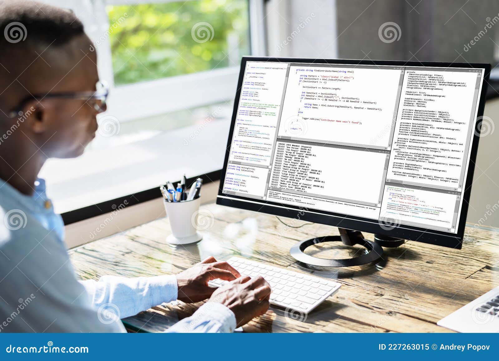 African American Coder Using Computer At Desk Stock Image Image Of