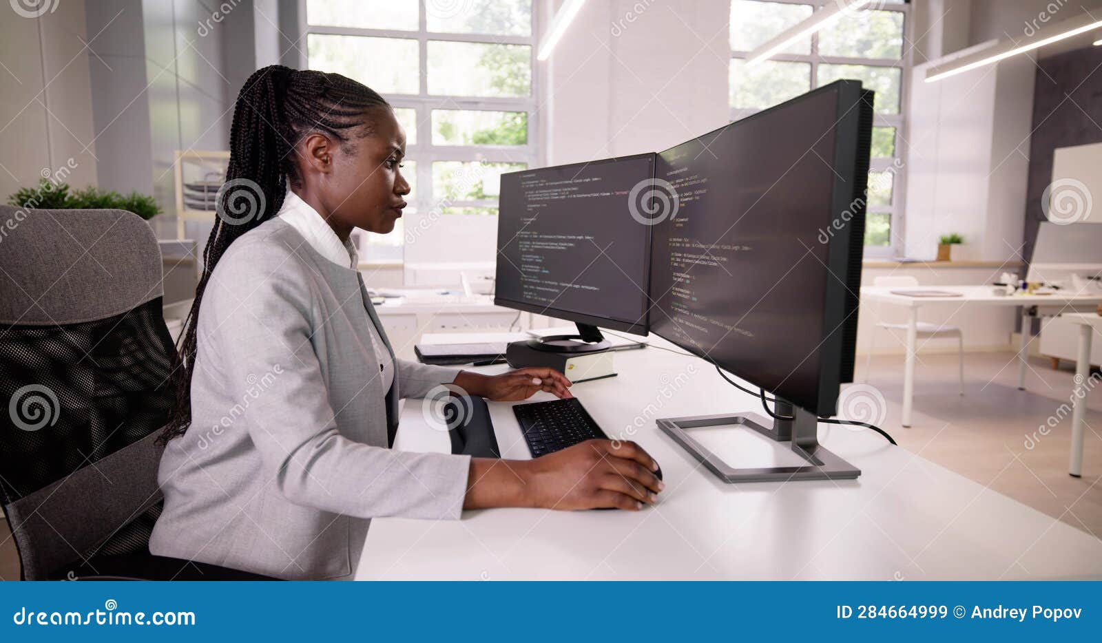 African American Coder Using Computer at Desk Stock Image - Image of women, desk: 284664999