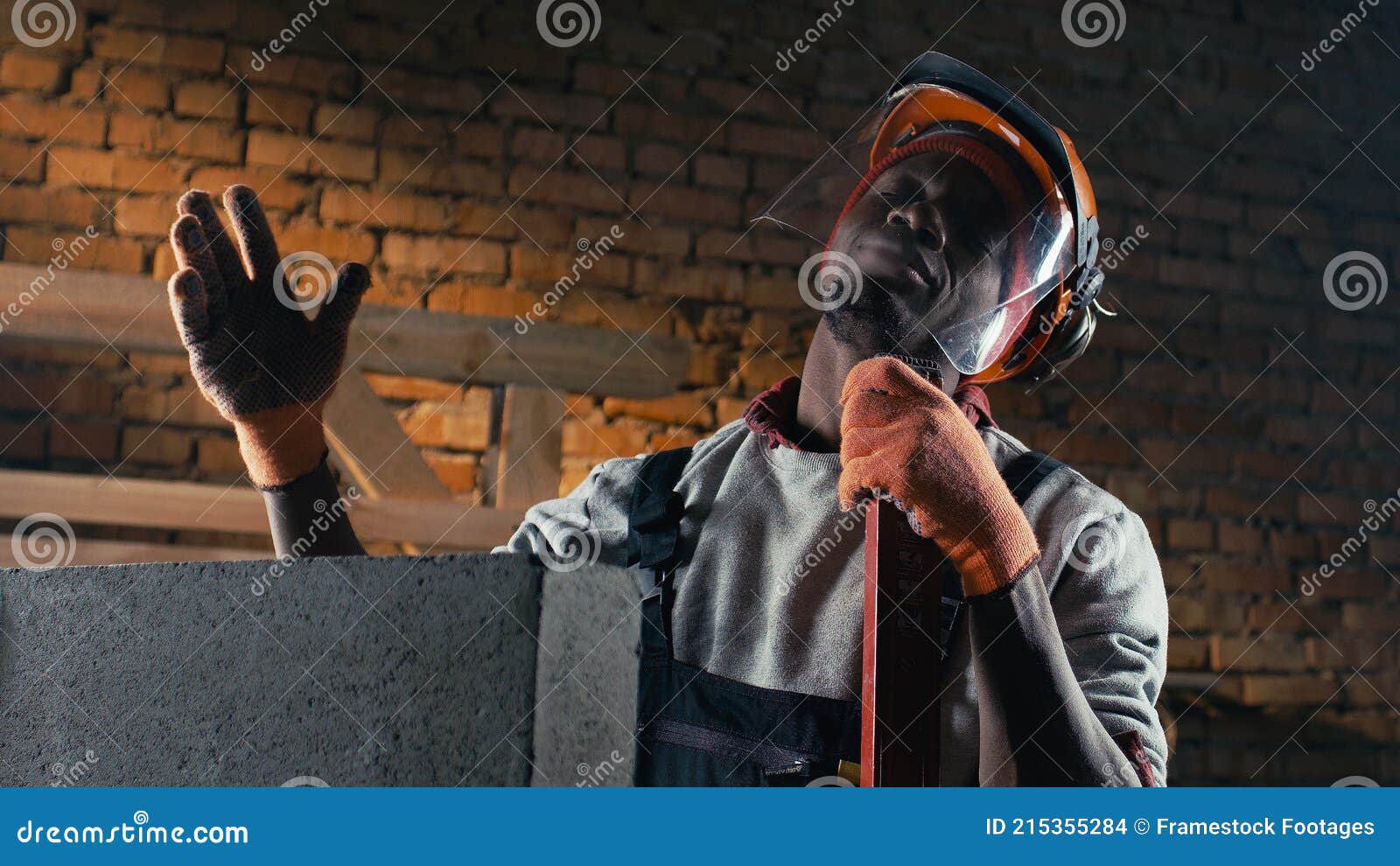 African American Contractor Singing during Work Stock Photo - Image of ...