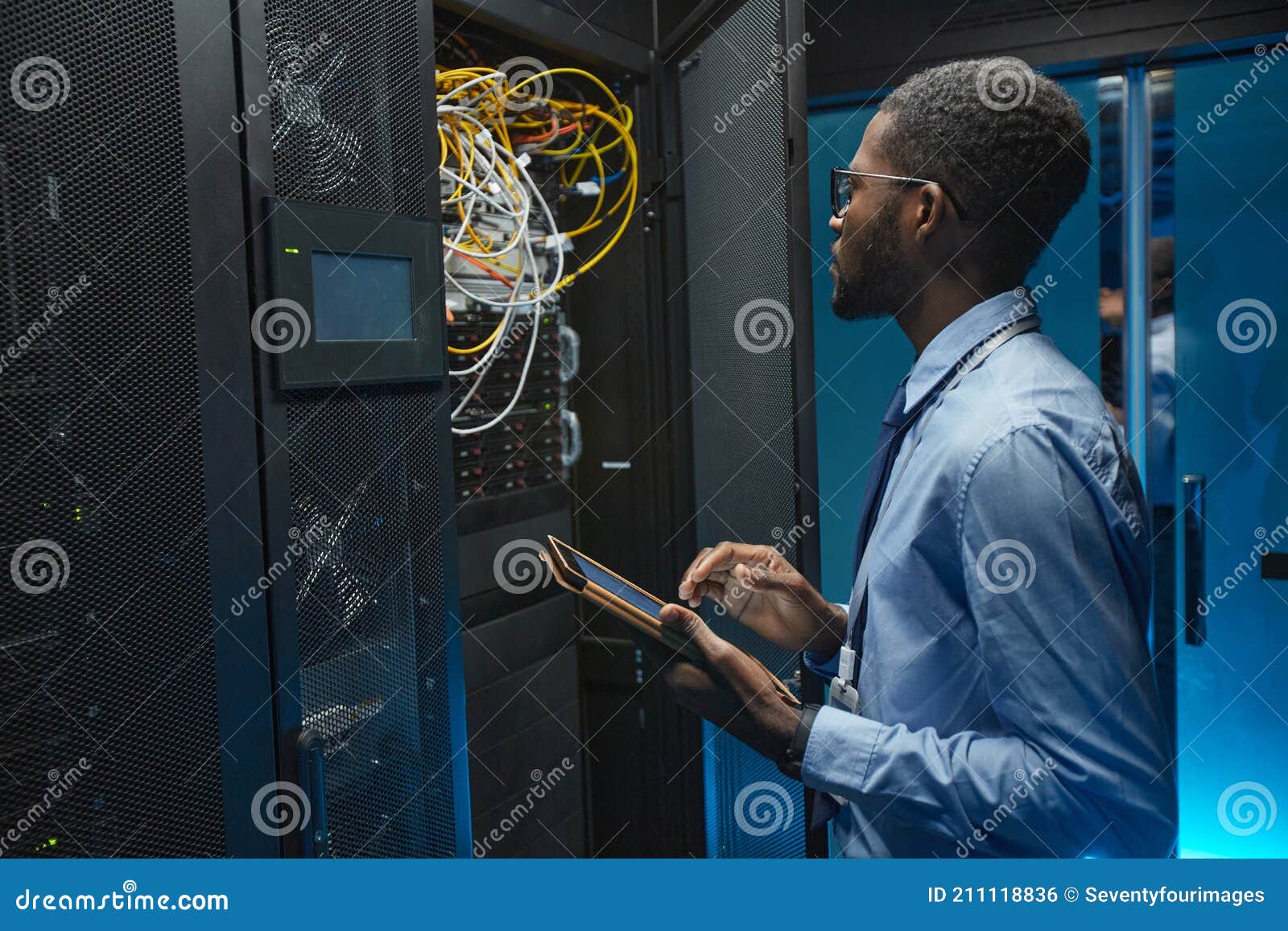 African American Data Engineer in Server Room Stock Photo - Image of ...