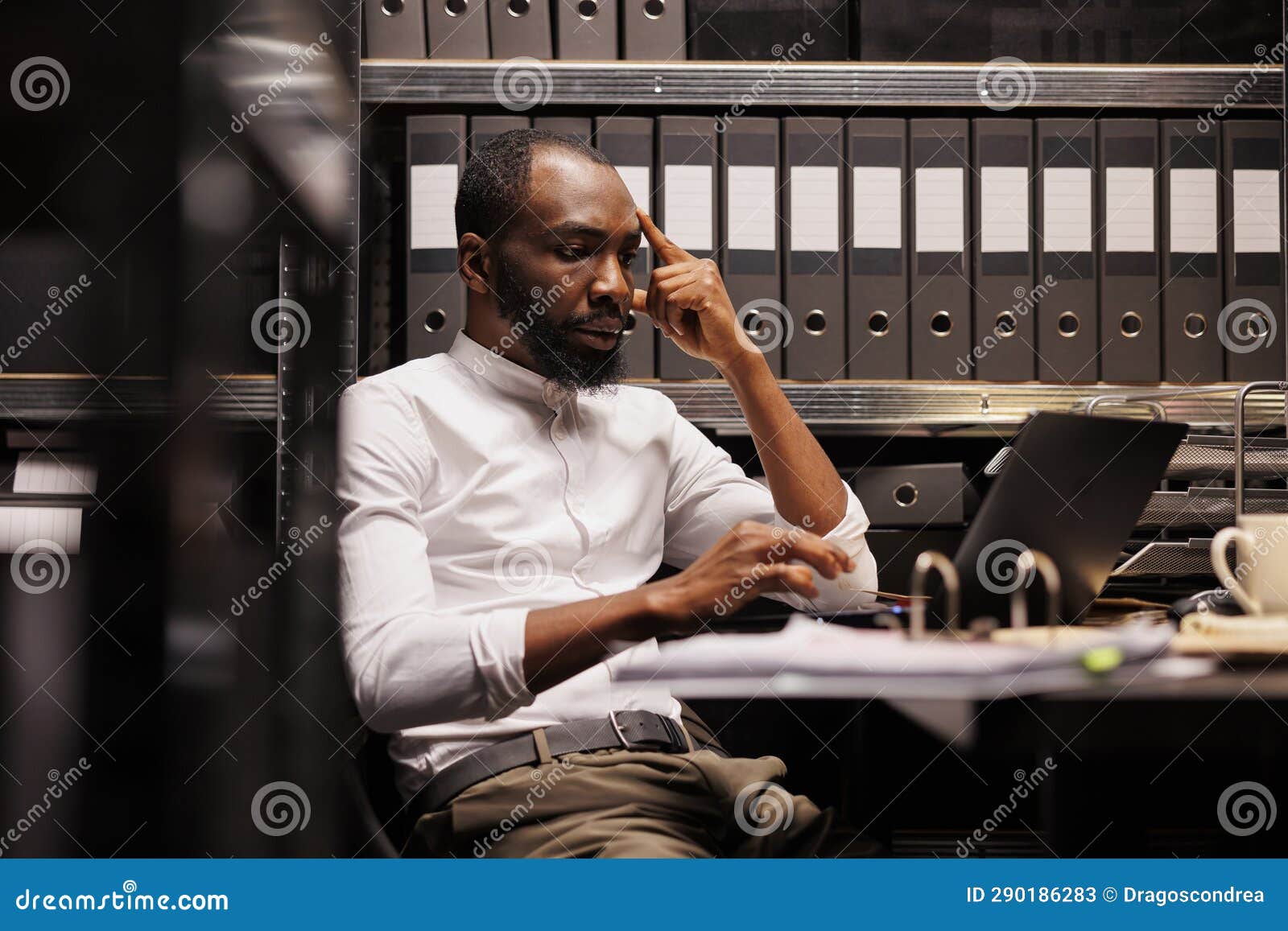 African American Detective Solving Complex Crime Case Using Laptop ...