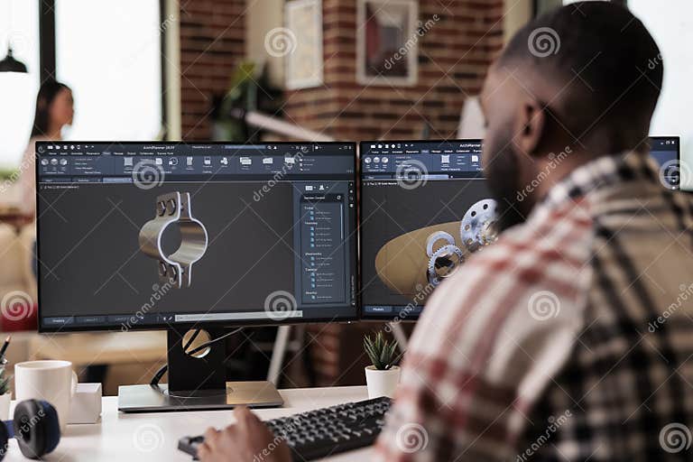 African American Developer Setting Up Gears Model Stock Photo - Image ...