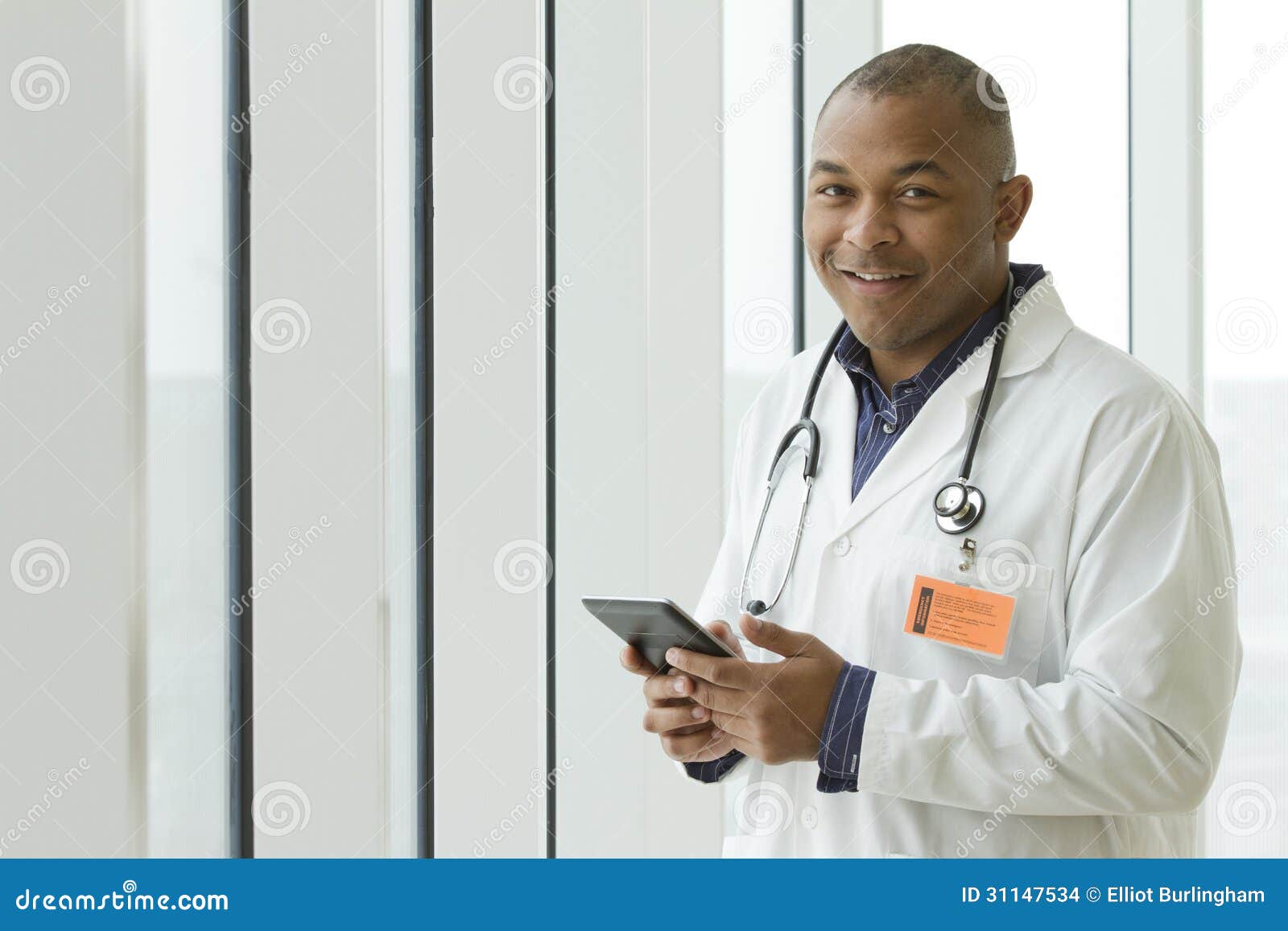 African American Doctor Holding Tablet Stock Photo - Image of clinical ...