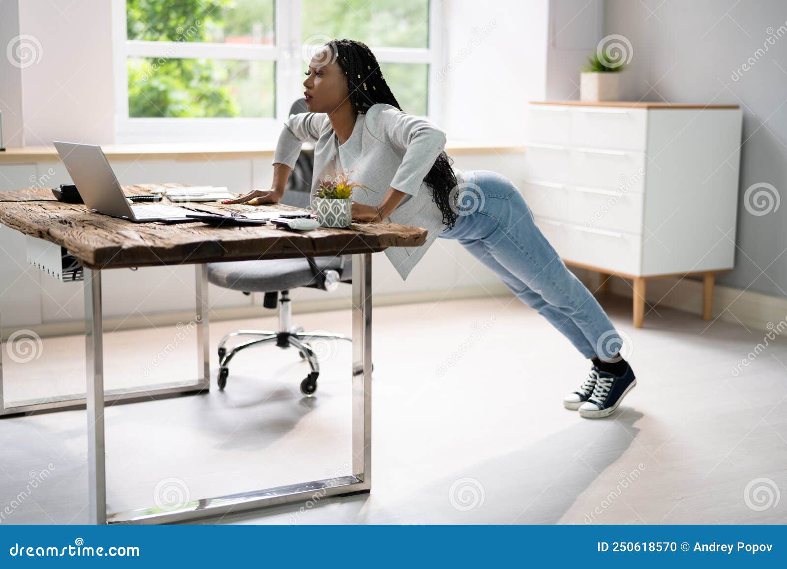 African American Doing Office Exercise Workout Stock Photo - Image of ...