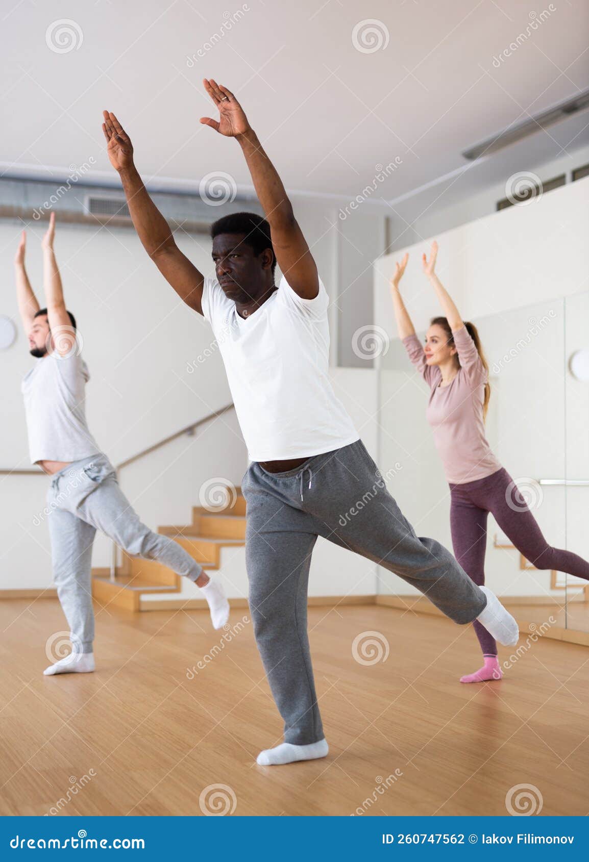 African American Doing Warm Up before Group Yoga Class Stock Photo ... African American Doing Warm Up before Group Yoga Class Stock Photo ...
