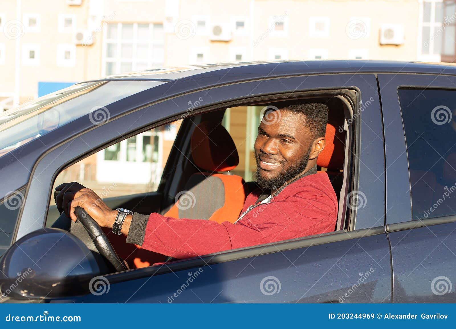 African-American Driving a Blue Car Stock Image - Image of inside ...