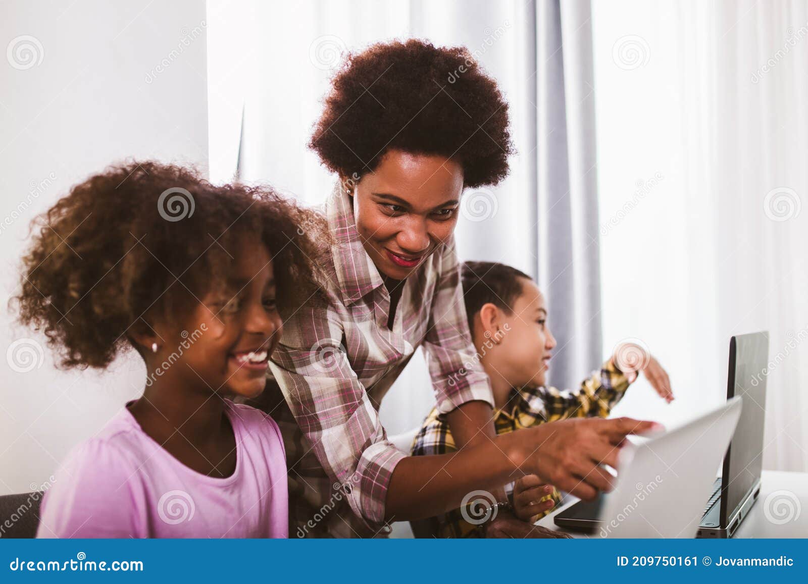 African American Elementary Students Using Computer and Following ...