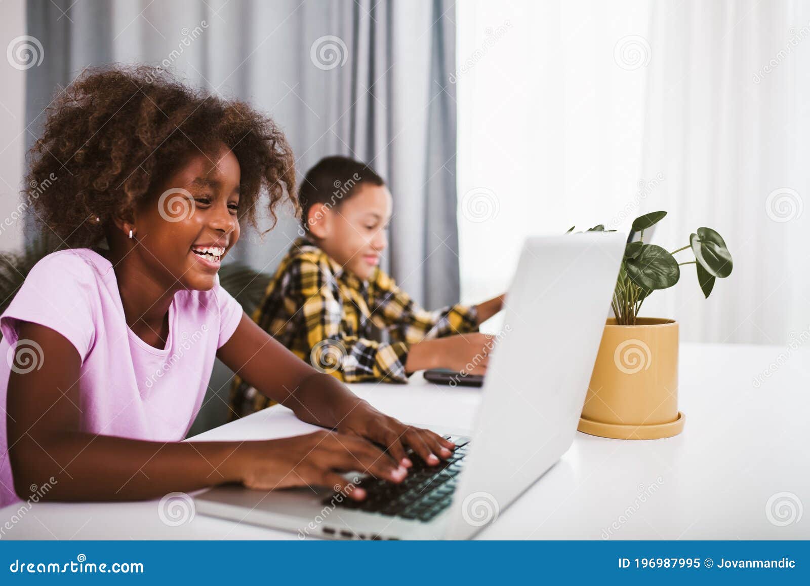 African American Elementary Students Using Computer and Following ...