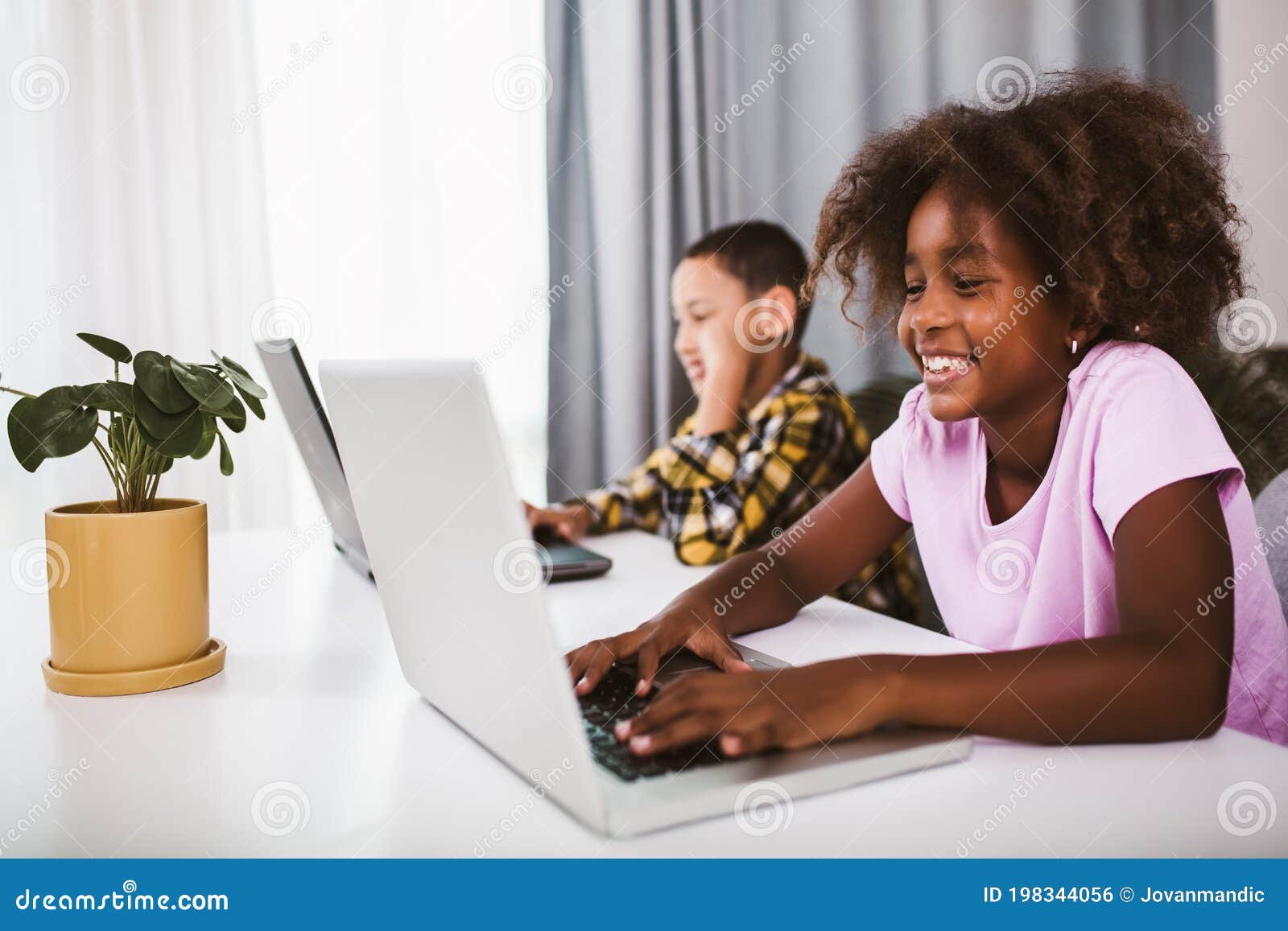 African American Elementary Students Using Computer and Following ...