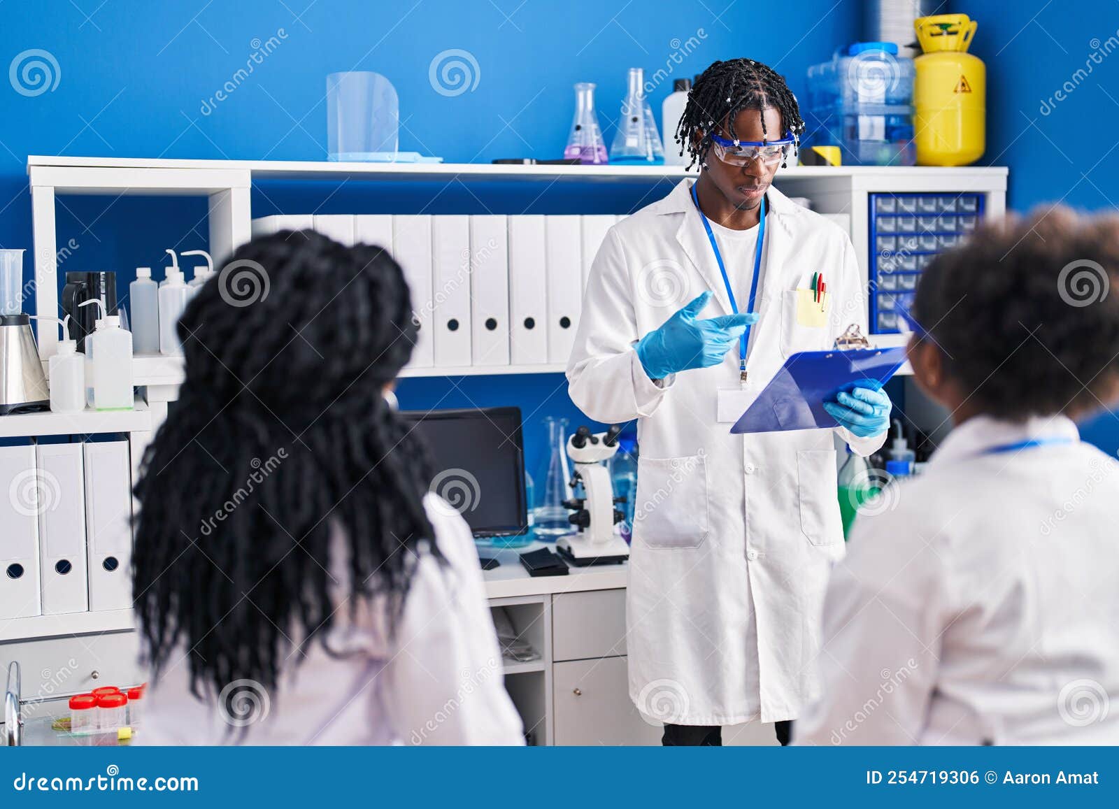 African American Friends Scientists Explaining Experiment at Laboratory Stock Photo - Image of ...
