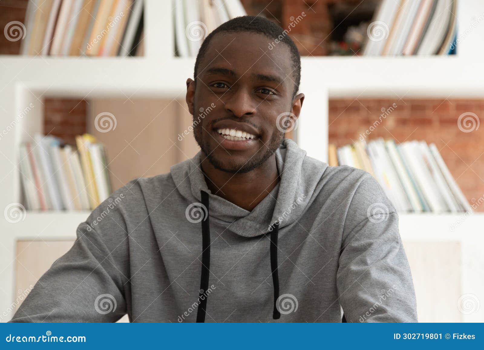 African American Male Look At Camera Having Video Call Stock Image