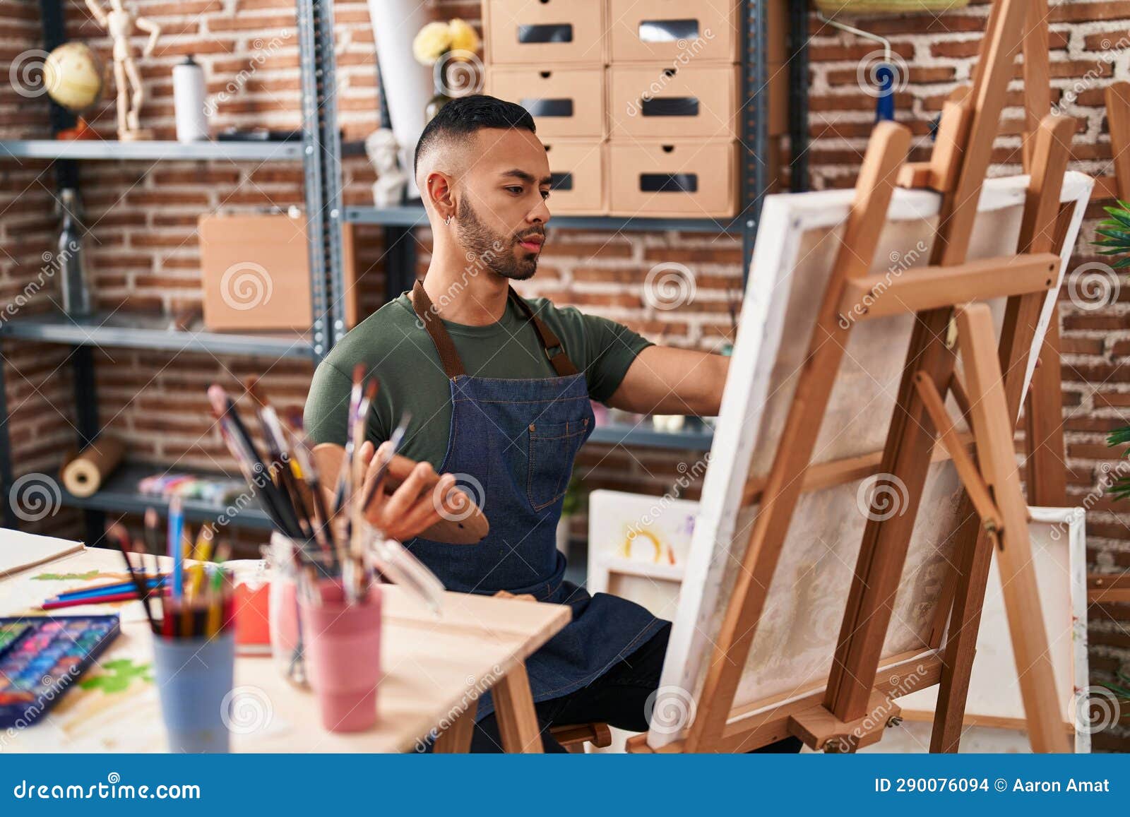 African American Man Artist Drawing with Doubt Expression at Art Studio ...