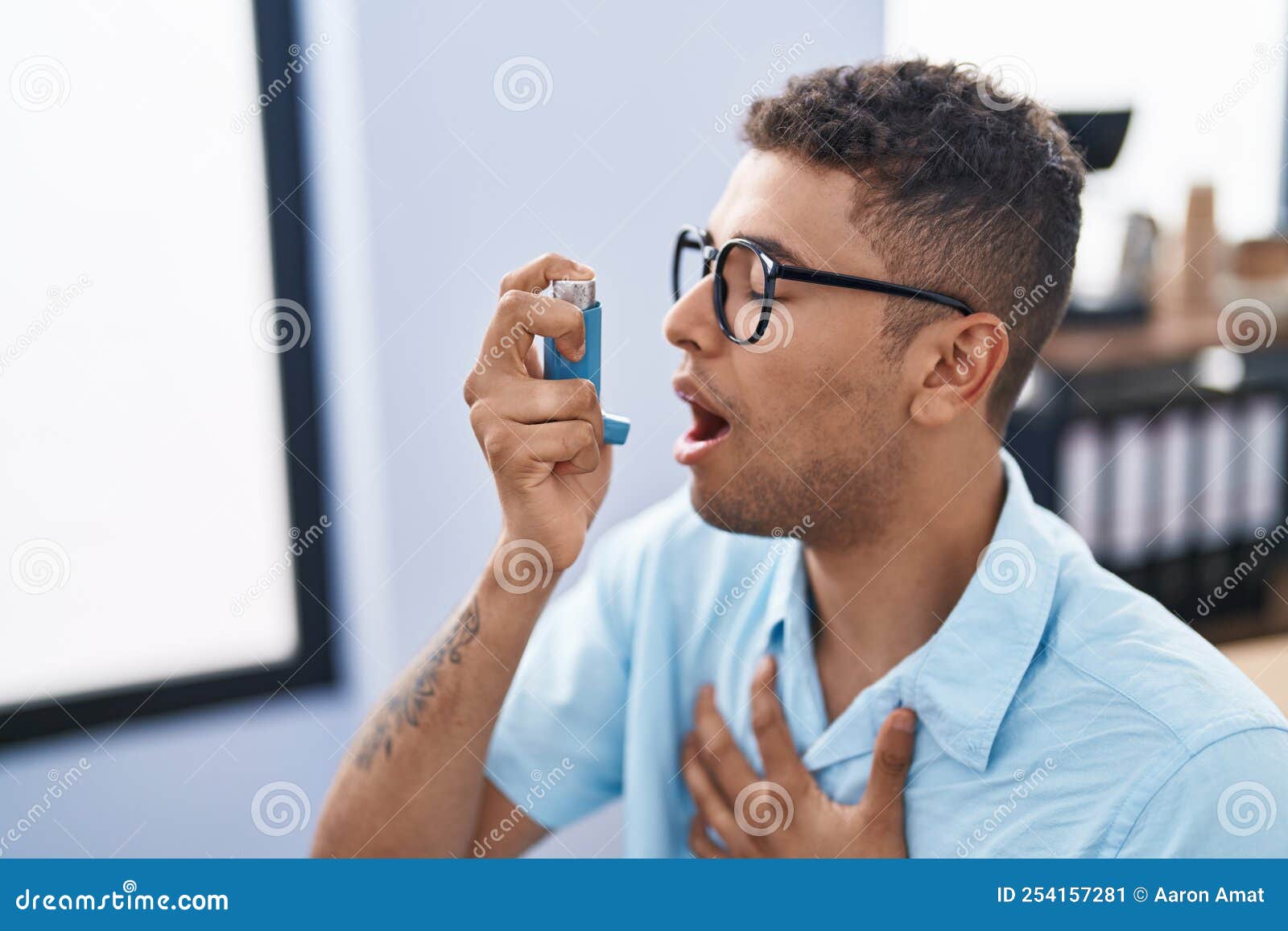 African American Man Business Worker Using Inhaler at Office Stock ...