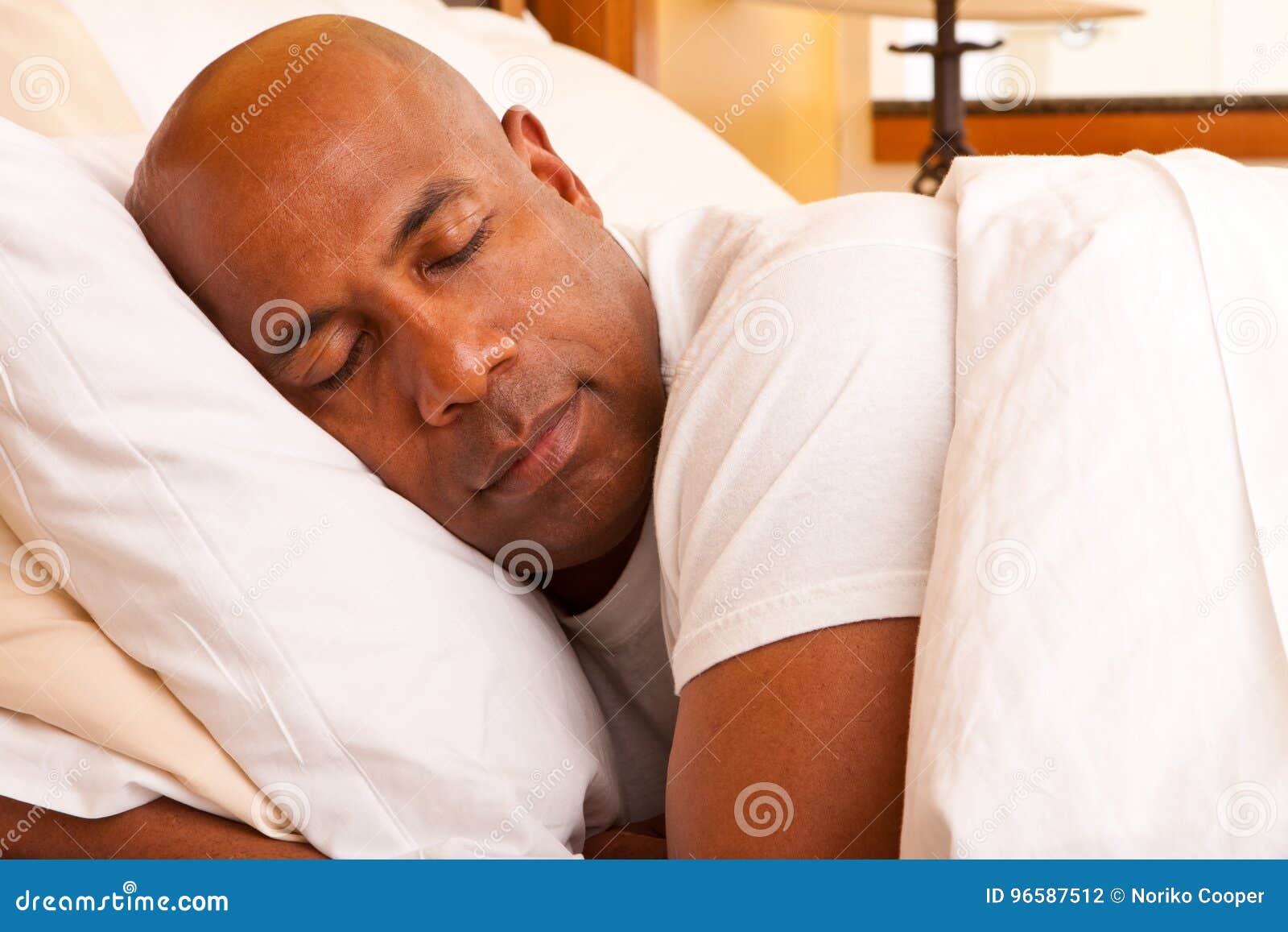 African American Man Getting a Good Nights Rest. Stock Photo - Image of ...