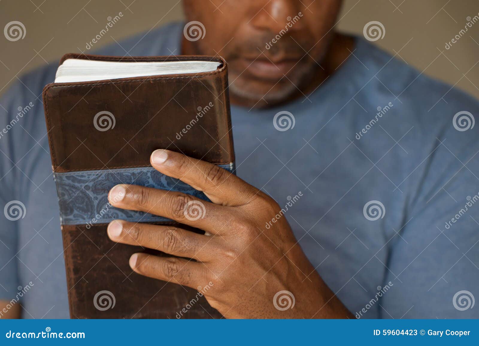 African American Man Holding the Bible Stock Image - Image of mature ...
