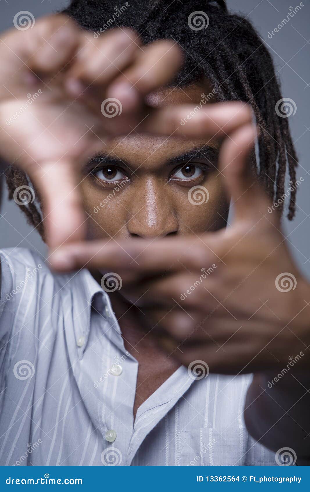 African American Man Looking through Framed Hands Stock Photo - Image ...