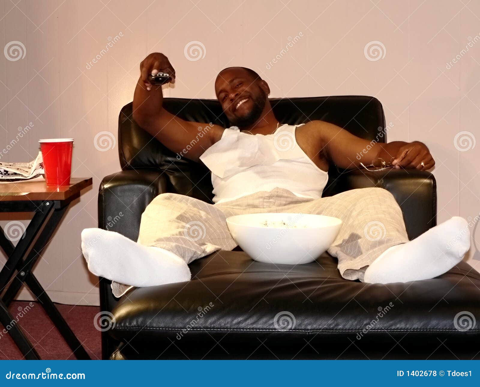 African American Man Lounging Stock Photo - Image of reclining ...